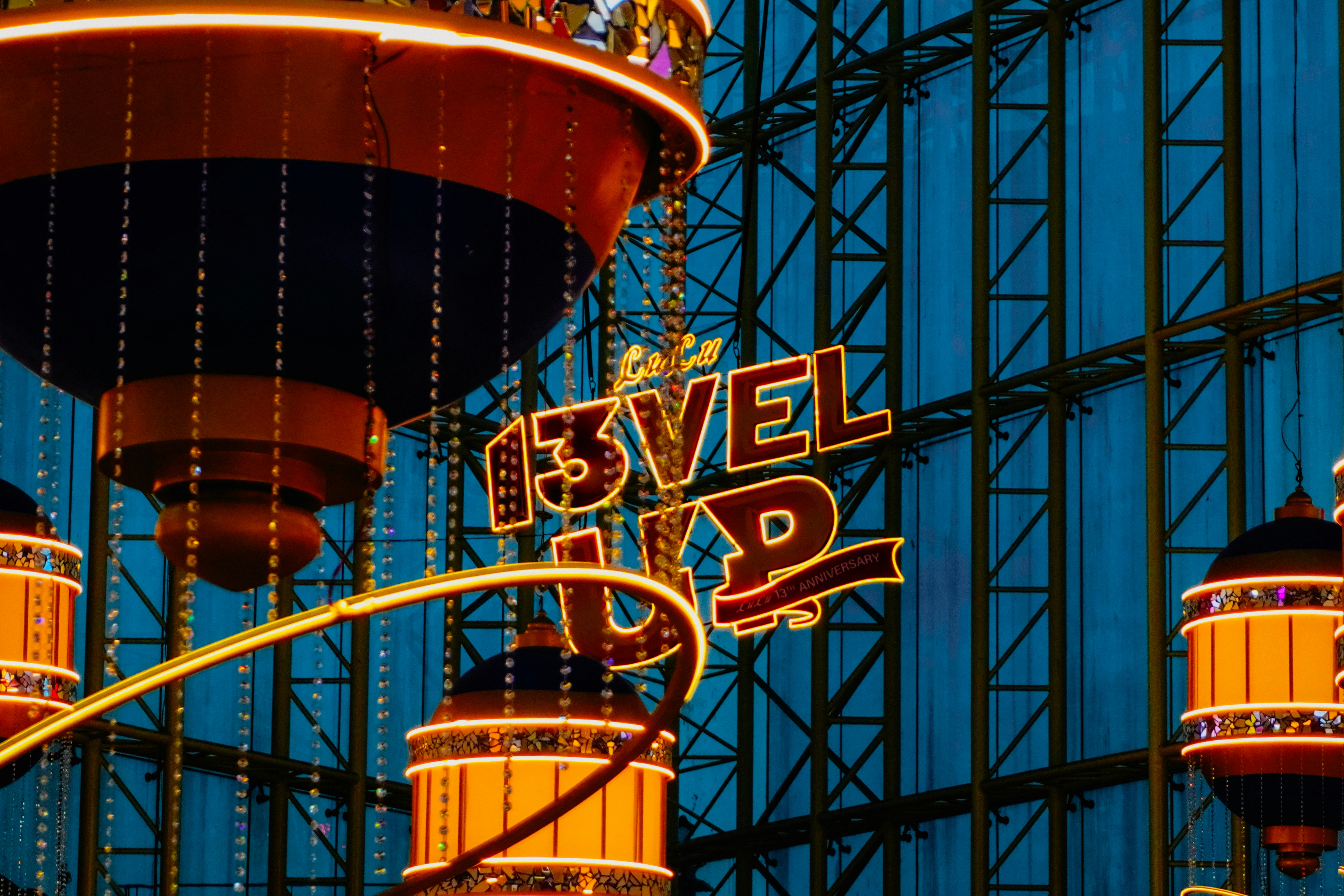 Neon Orbit: The Glowing Sign Sets the Stage in a Dazzling Indoor Landmark