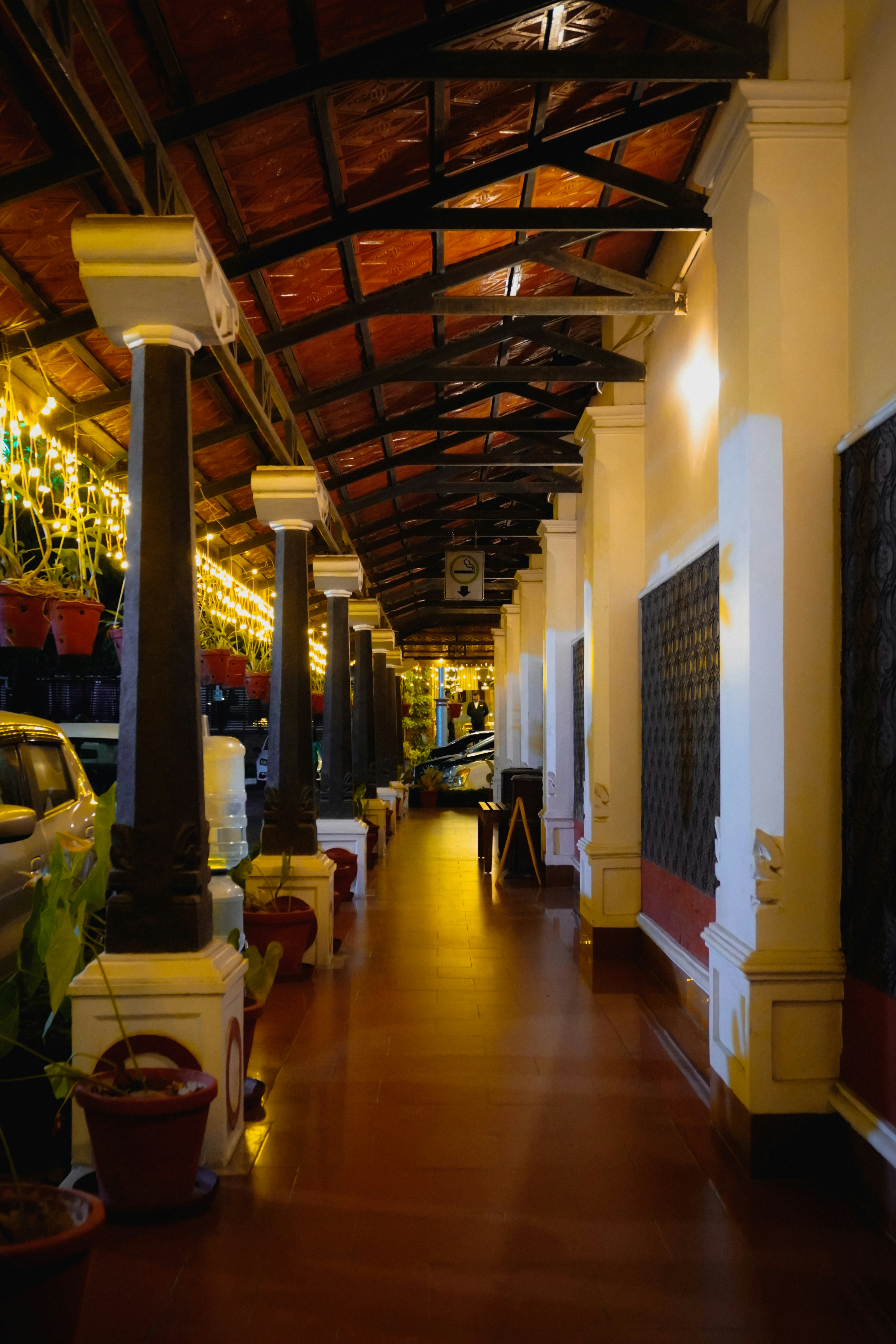 Colonial Corridor Under Warm Lanterns