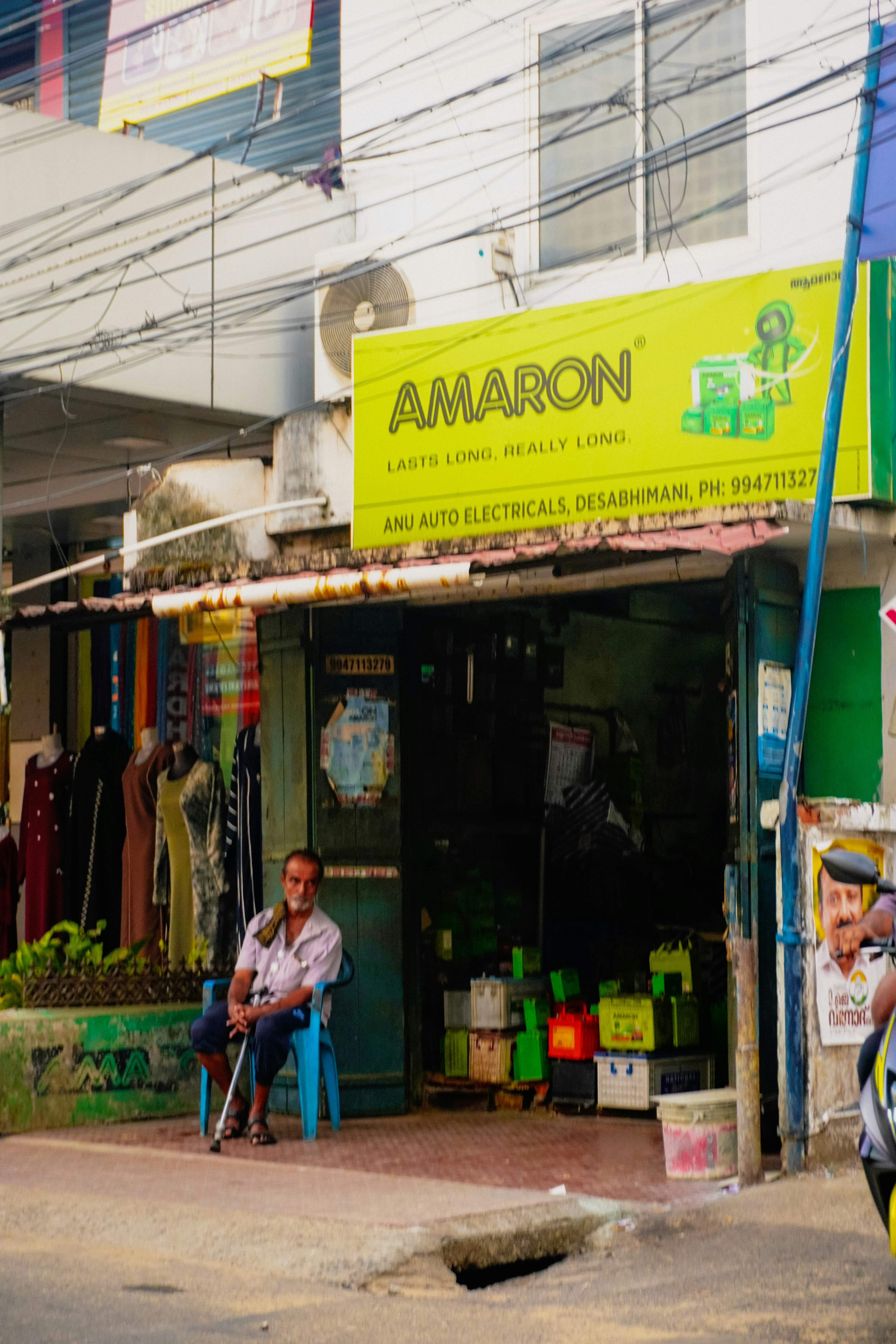 Blue Chair, Yellow Sign: Streetshop Quietly Guarding the Corner