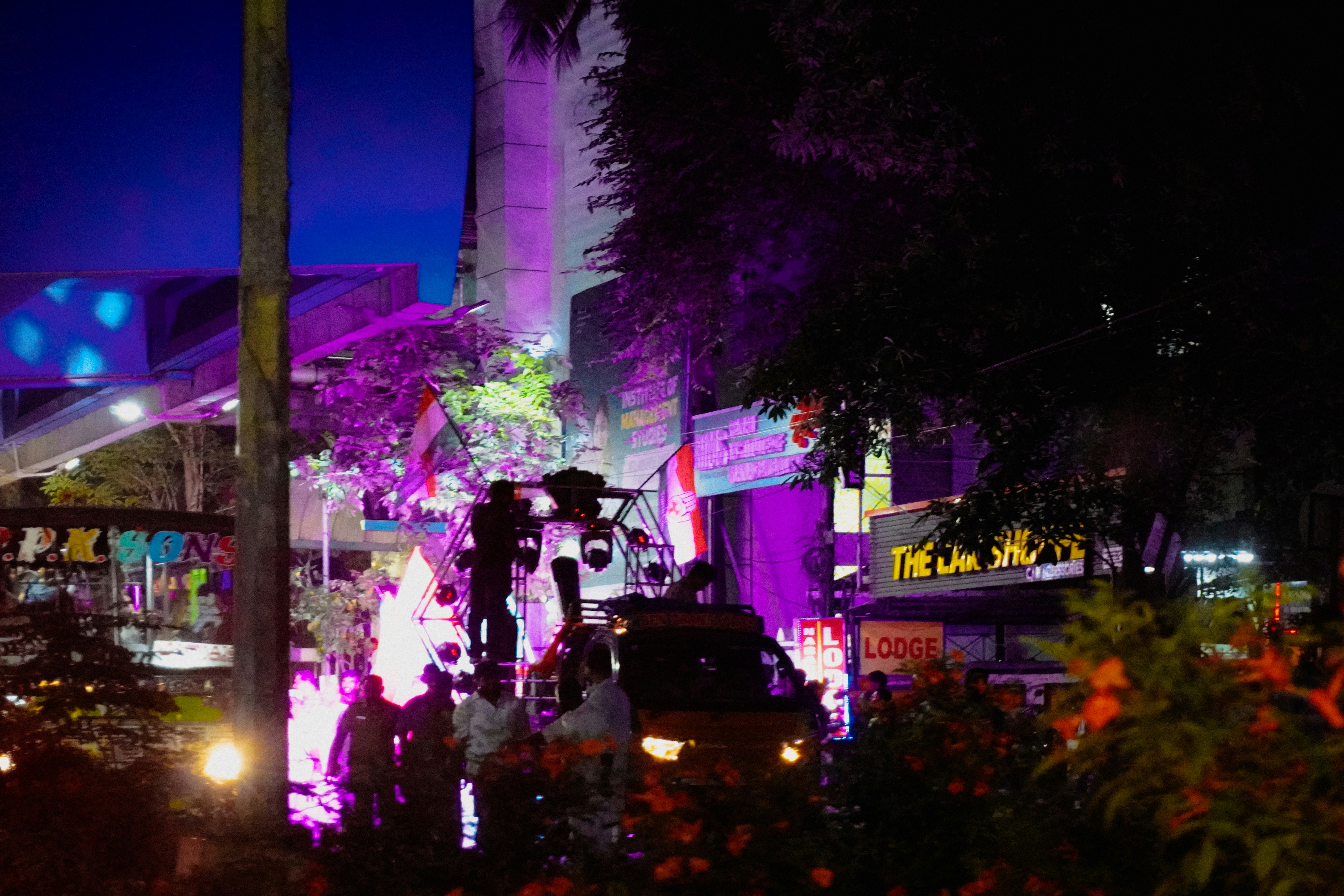 Night Scene at a Neon-Lamed Street: A Microcosm of Color and Motion