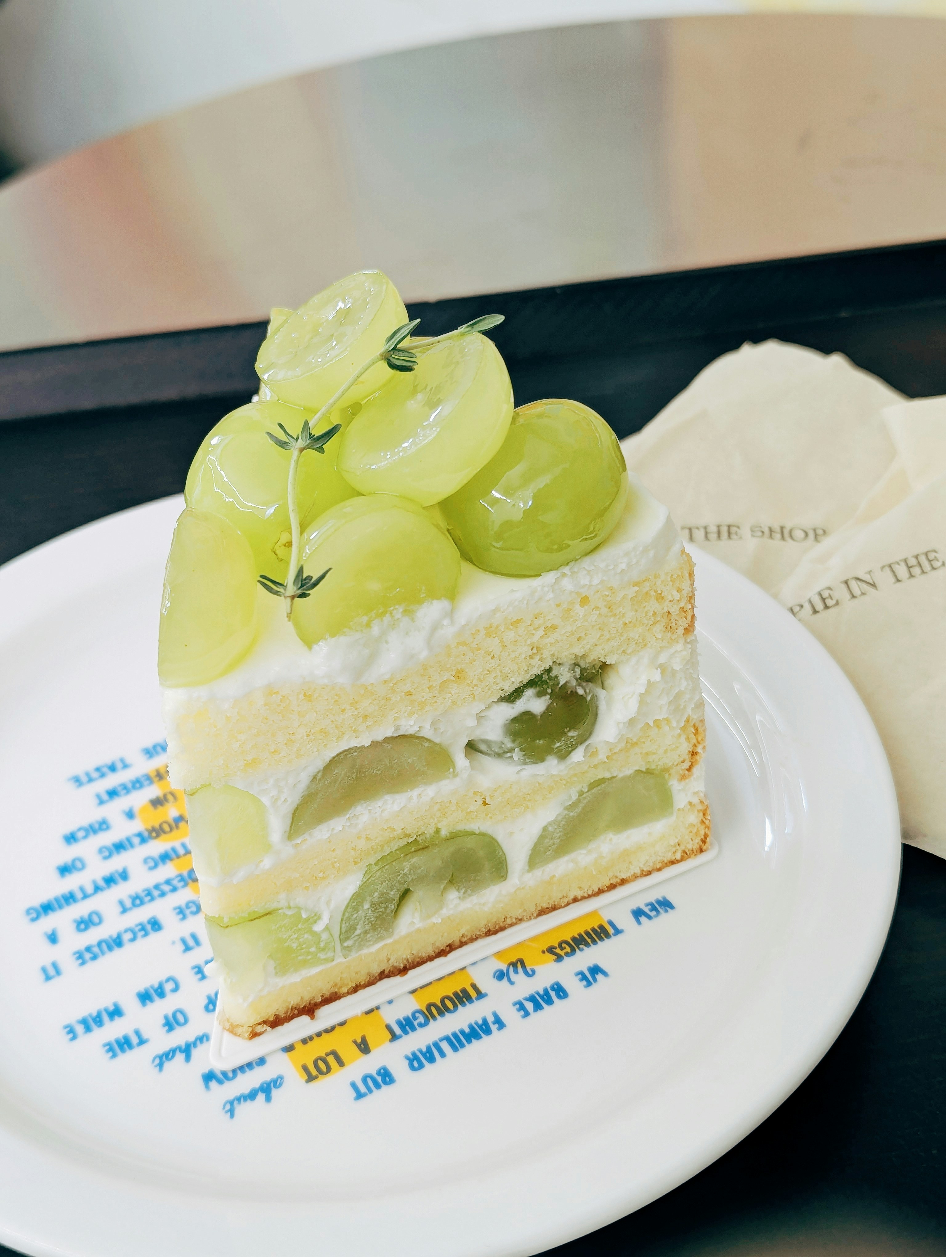 Citrus Cream Layer Cake Slice on a White Plate