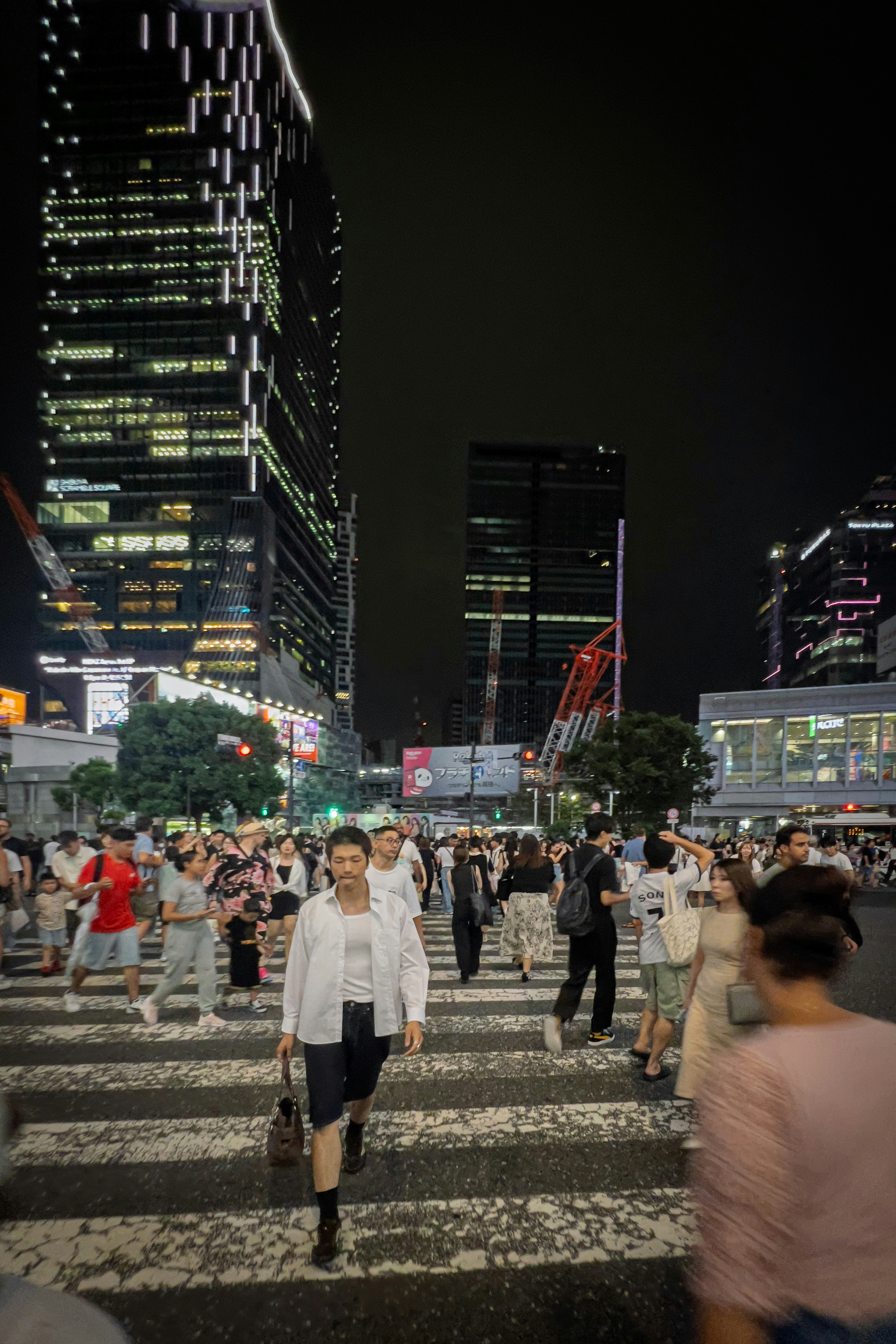 Midnight Crosswalk: City Pulse Under Neon Skies