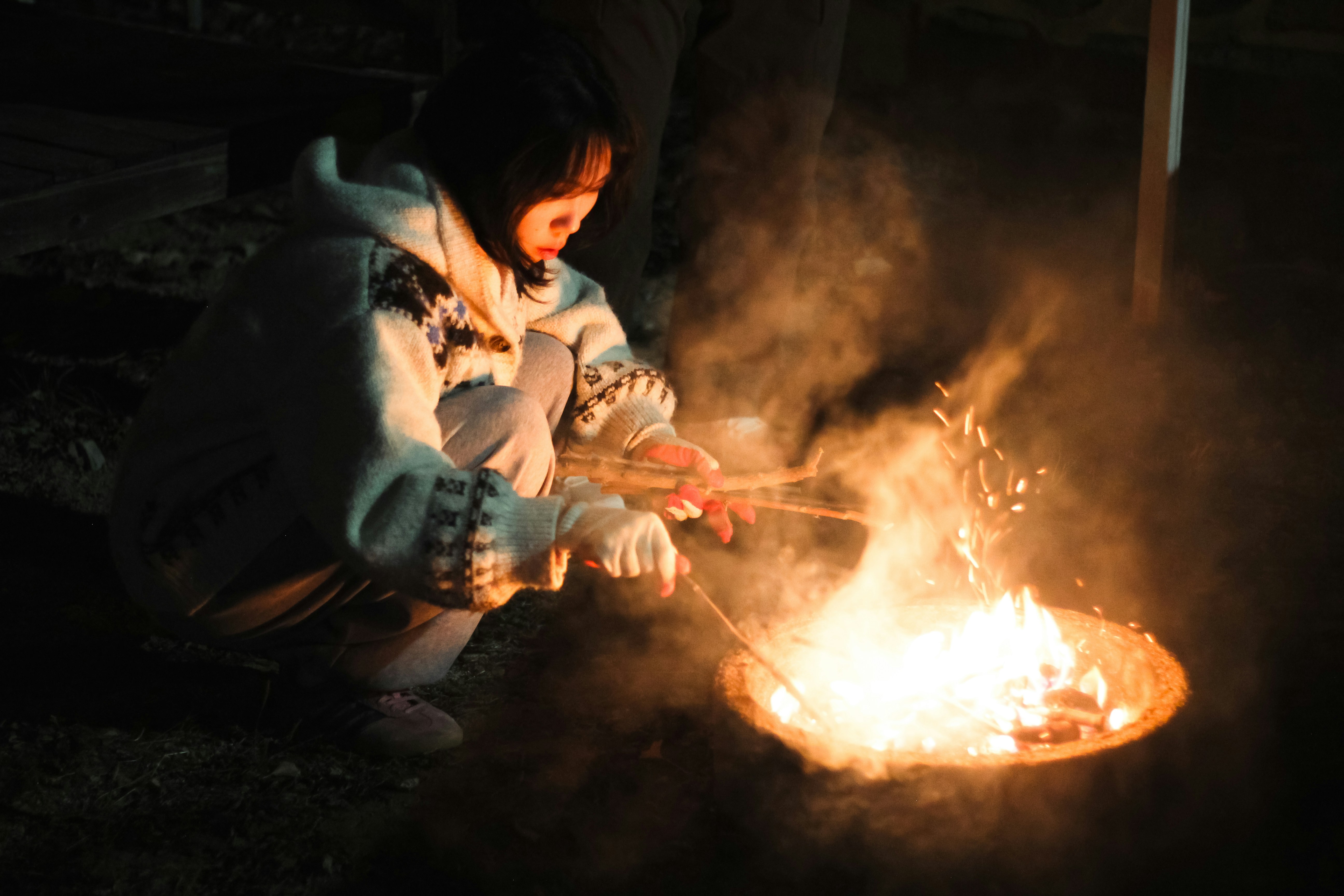 Ember Child: Quiet Focus by the Fire