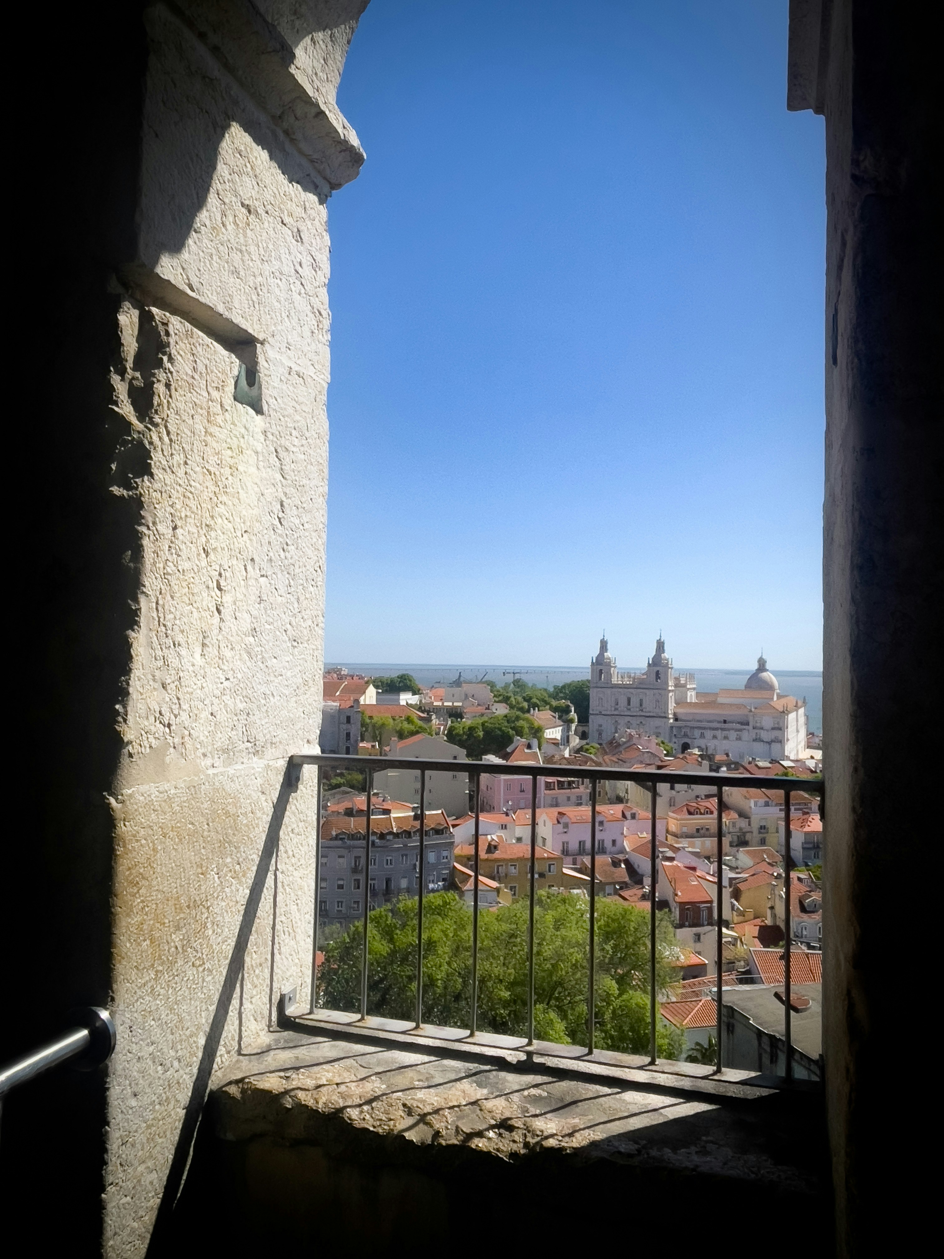 A Balcony Vantage Over a Coastal Town