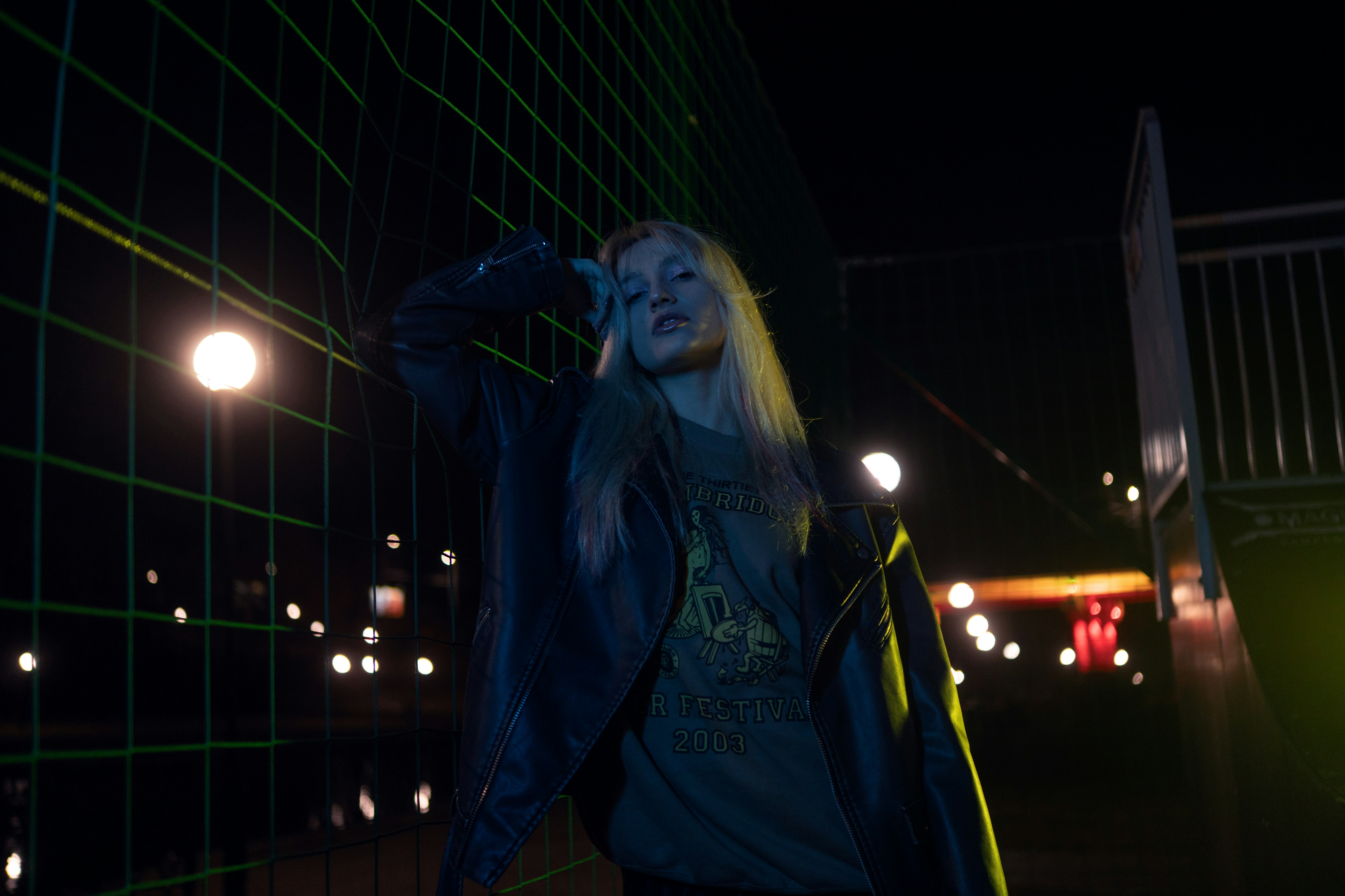 Neon Night Portrait: An Attitude Amid the Fence