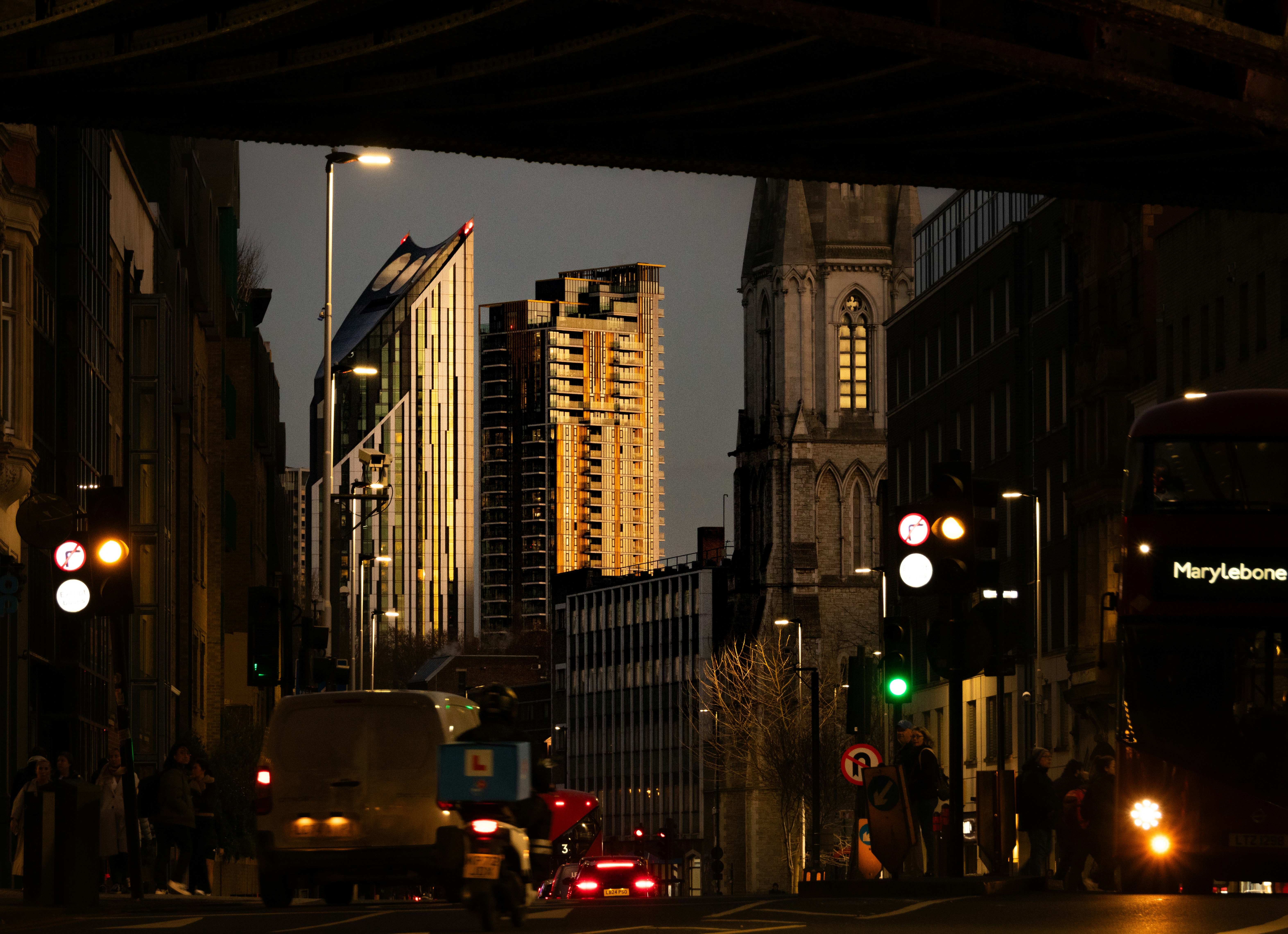 City in Focus: Evening Traffic Under Neon Gloaming