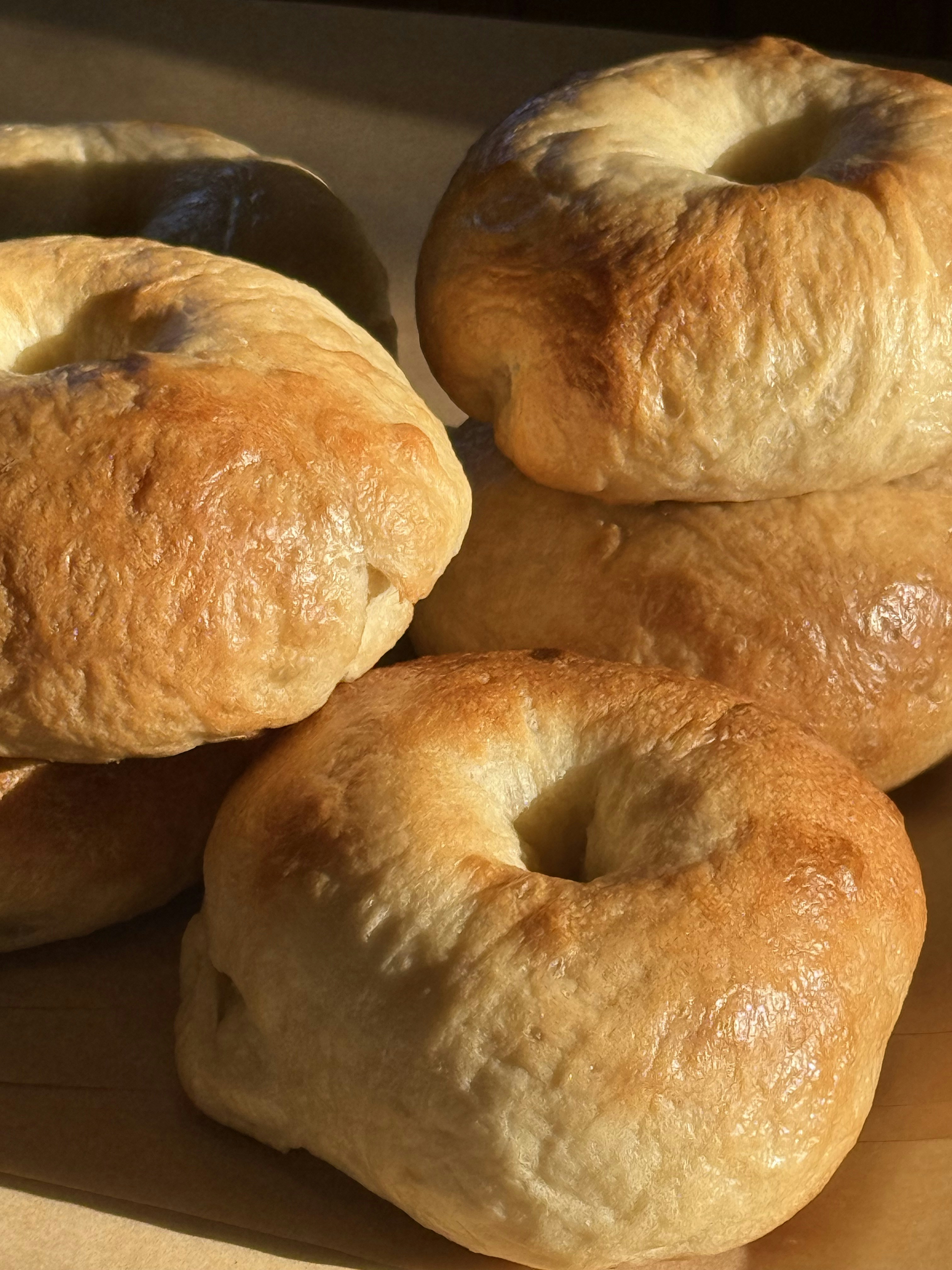 Golden Ringed Pastries: Close-Up of Freshly Baked Donuts