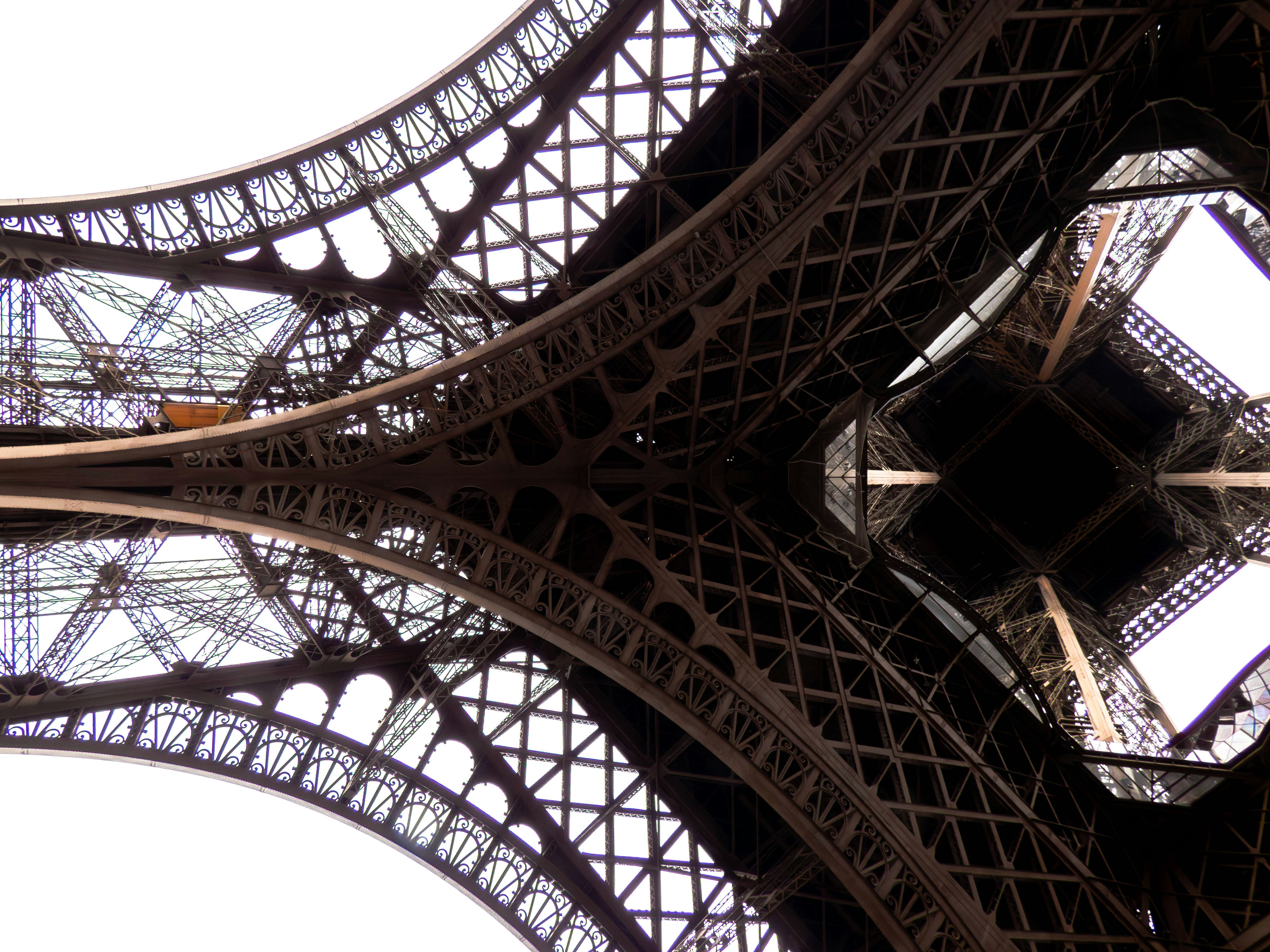 Under the Lattice: A Close-Up of the Eiffel Tower's Iron Weave