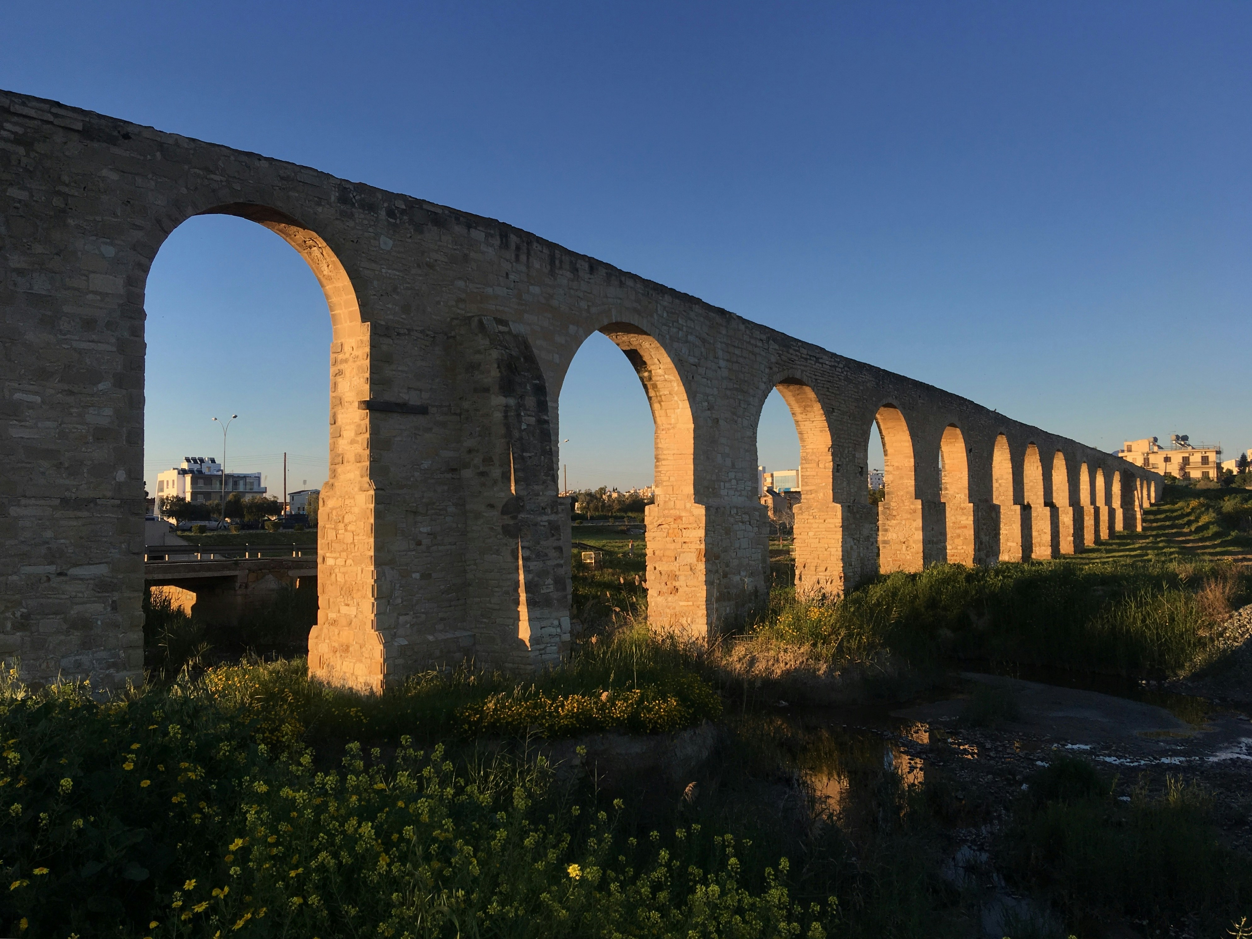 Sunlit Viaduct Arches Casting Long Shadows