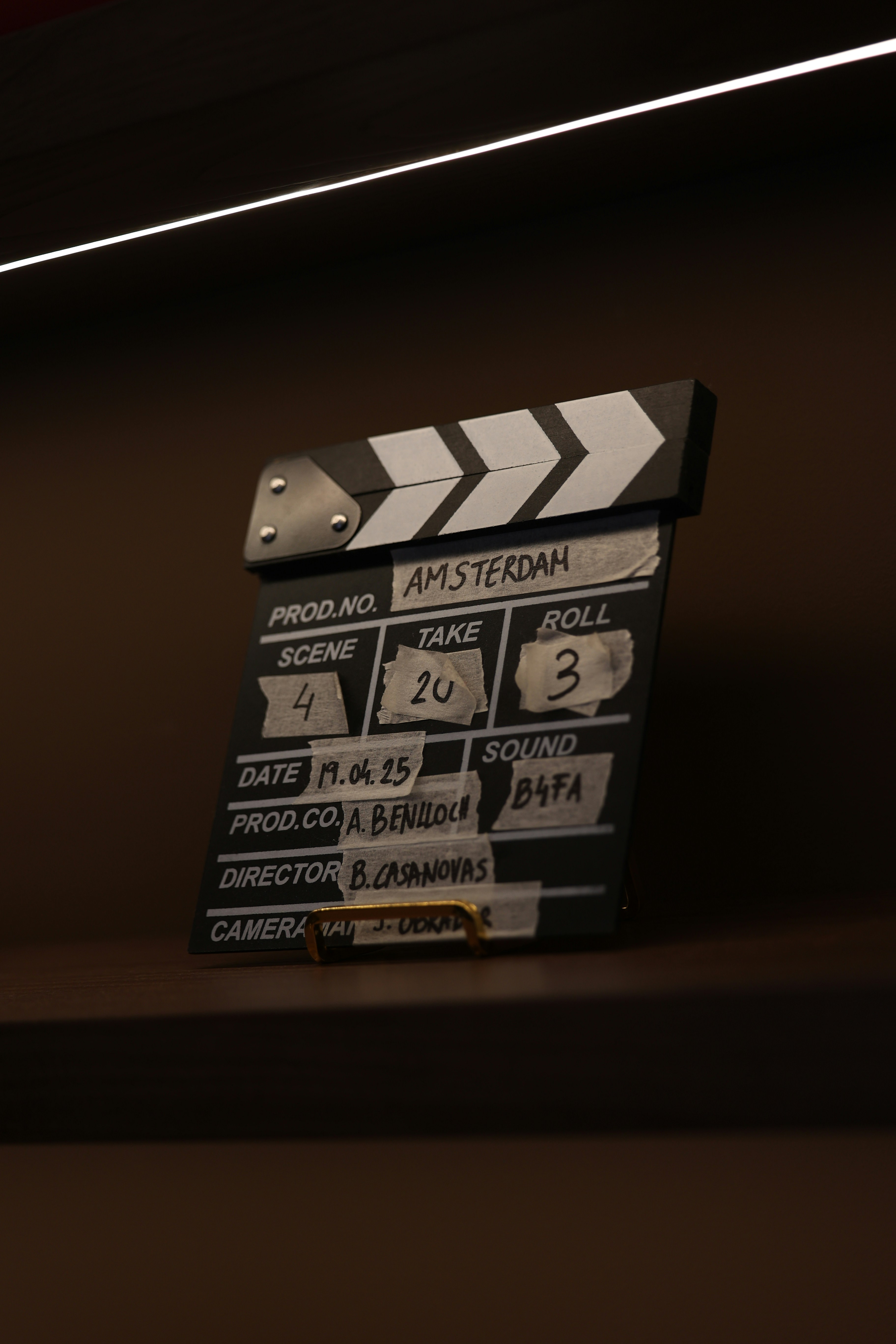Clapperboard in warm studio glow