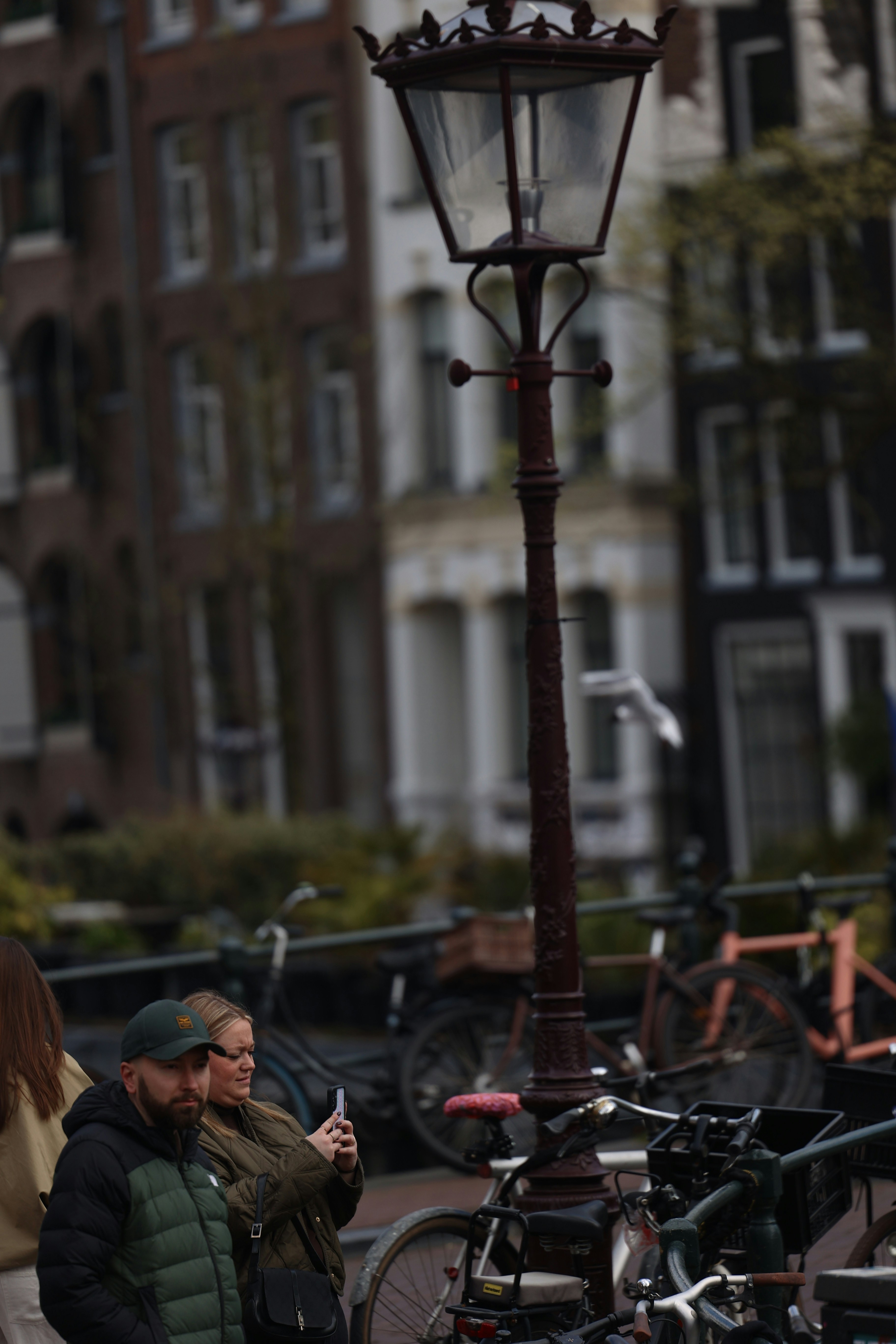 Gaslit Streetlamp Amid Quiet Canalside