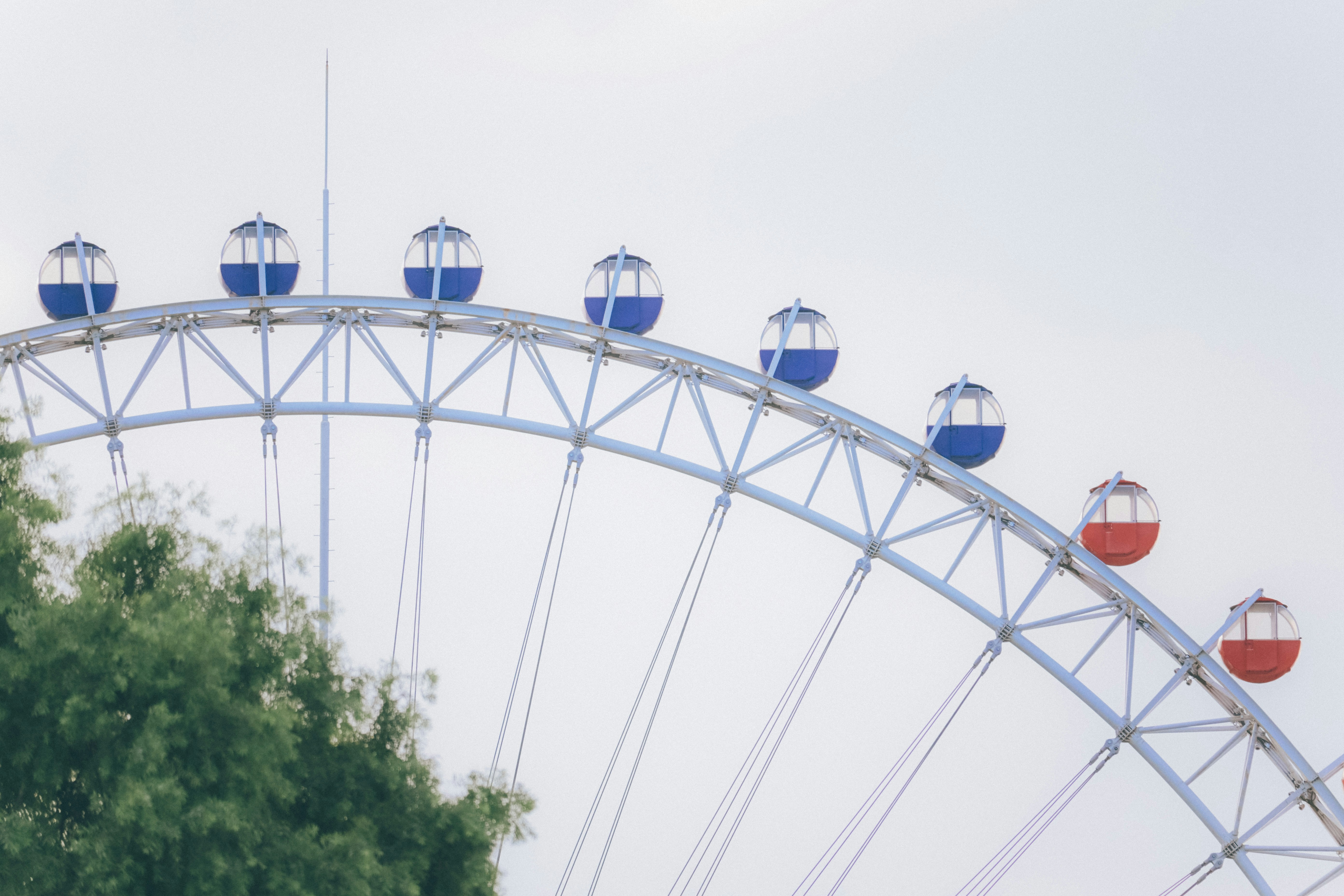 Aerial Rings: Partial Ferris Wheel Cresting the Skyline
