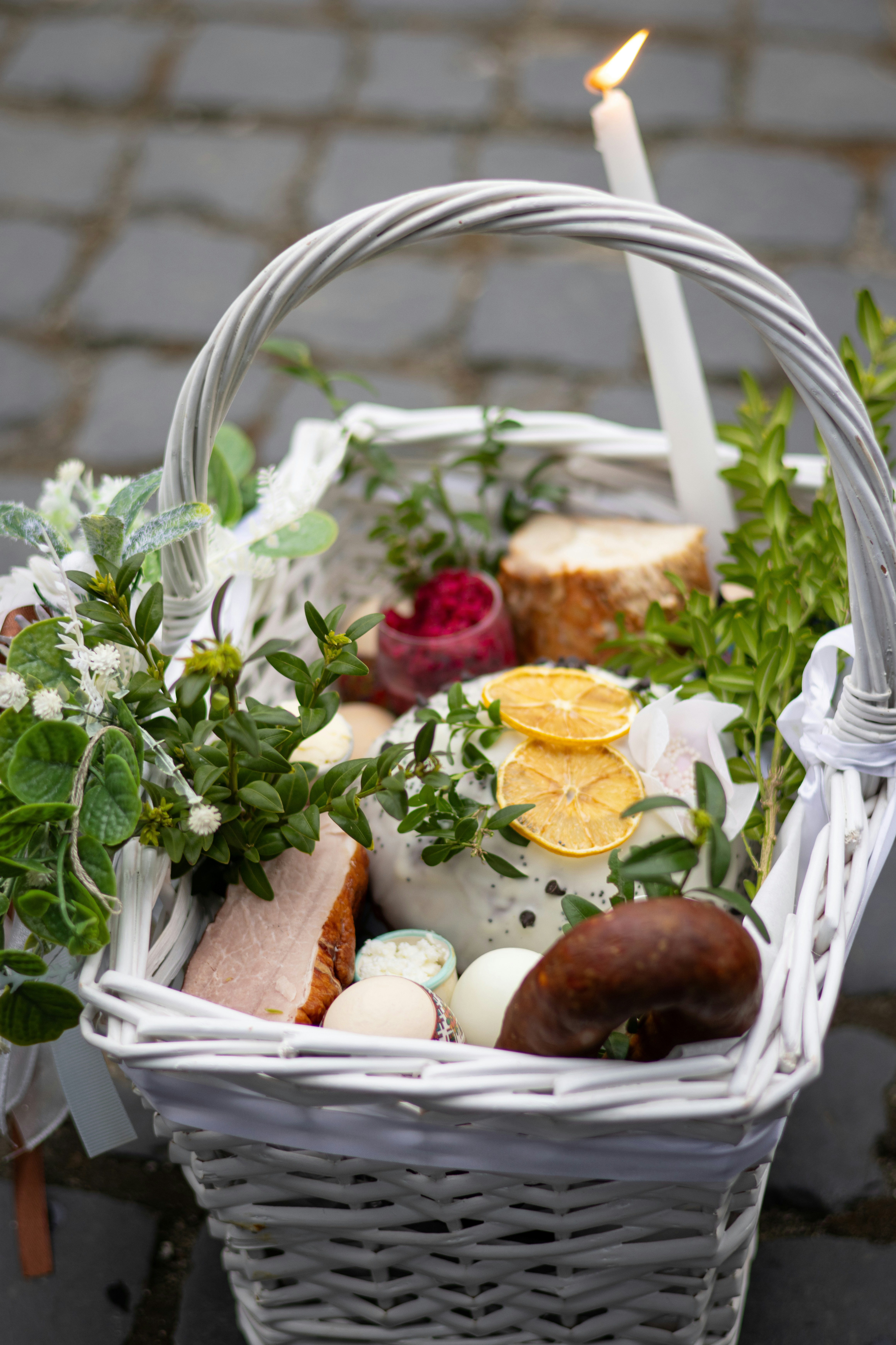 Wicker Basket of Treats: Dried Citrus, Fresh Herbs, and Candlelight