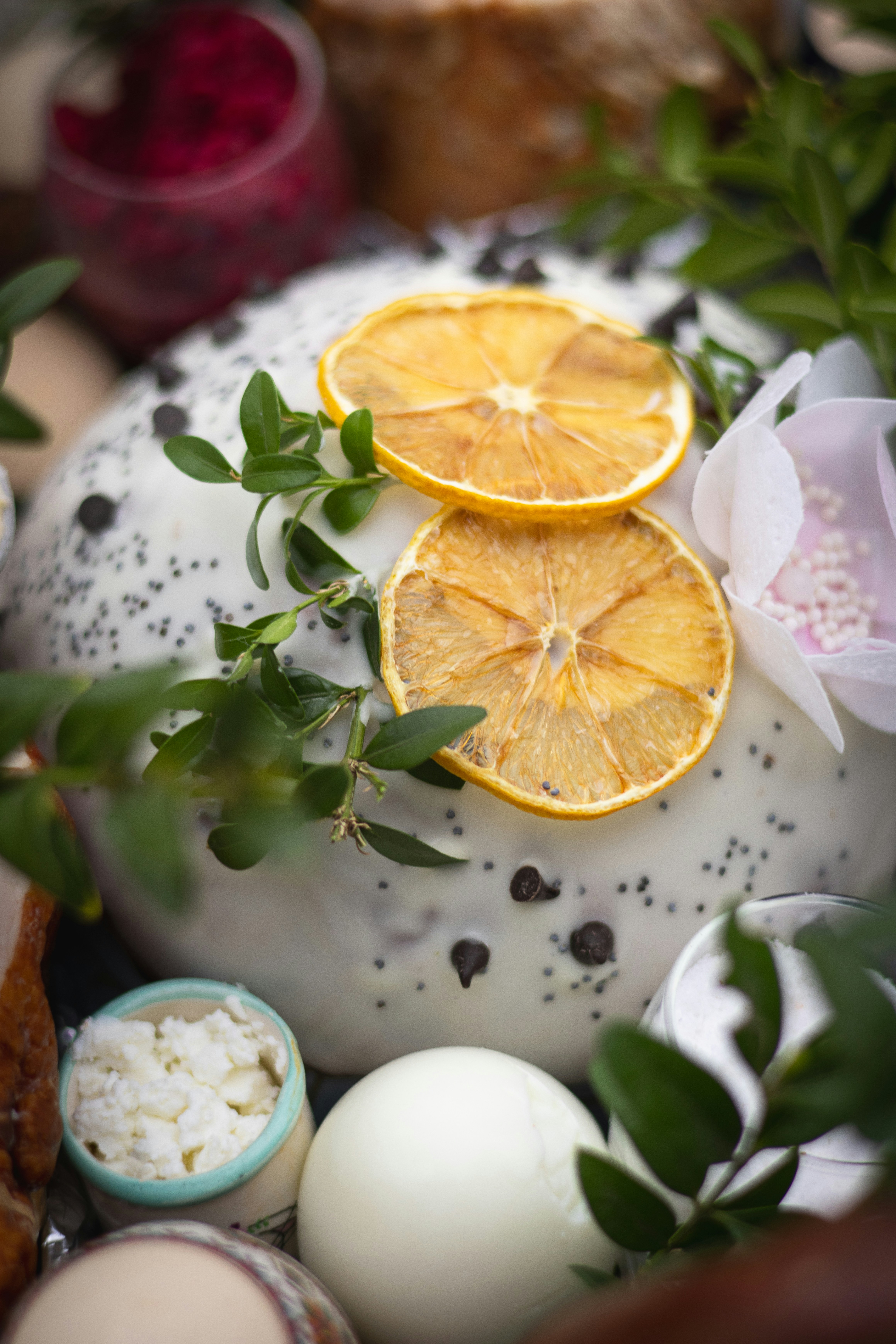 Citrus Crown over a Frosted Cake: A Seasonal Still Life