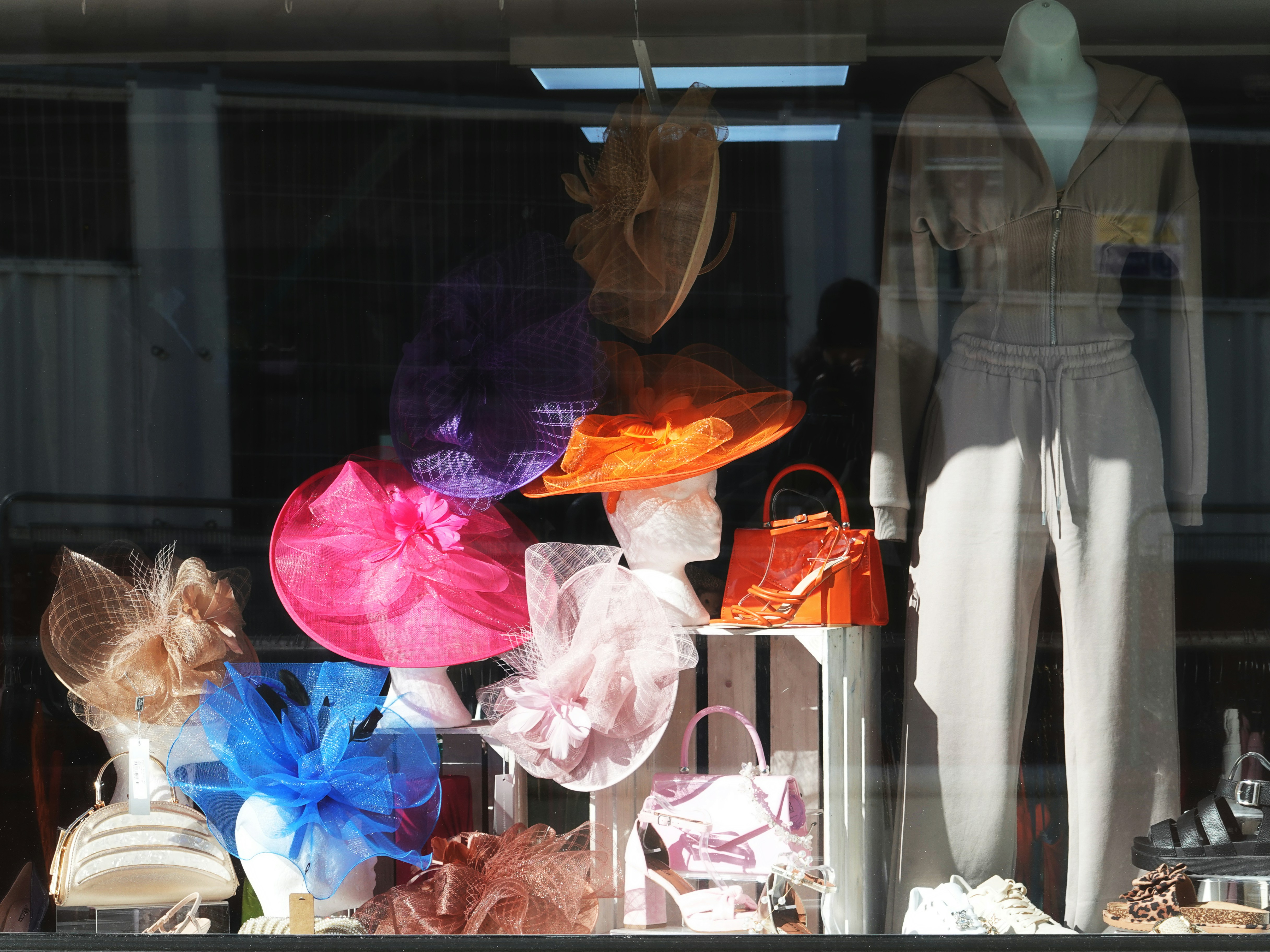 Colorful Hats and Fashion Accessories in a Storefront Display