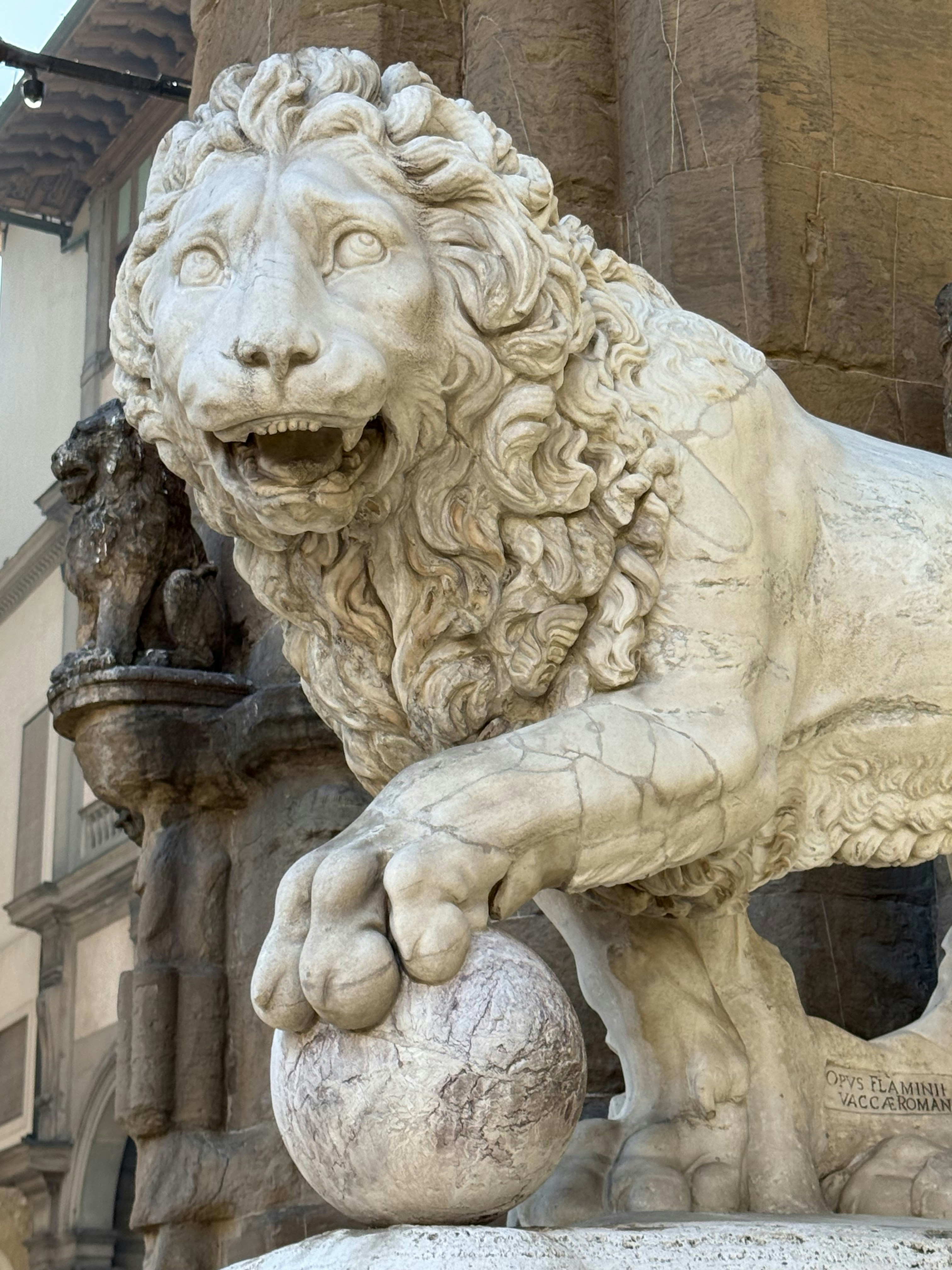 Majestic Stone Guardian: A Lion, The World in Marble