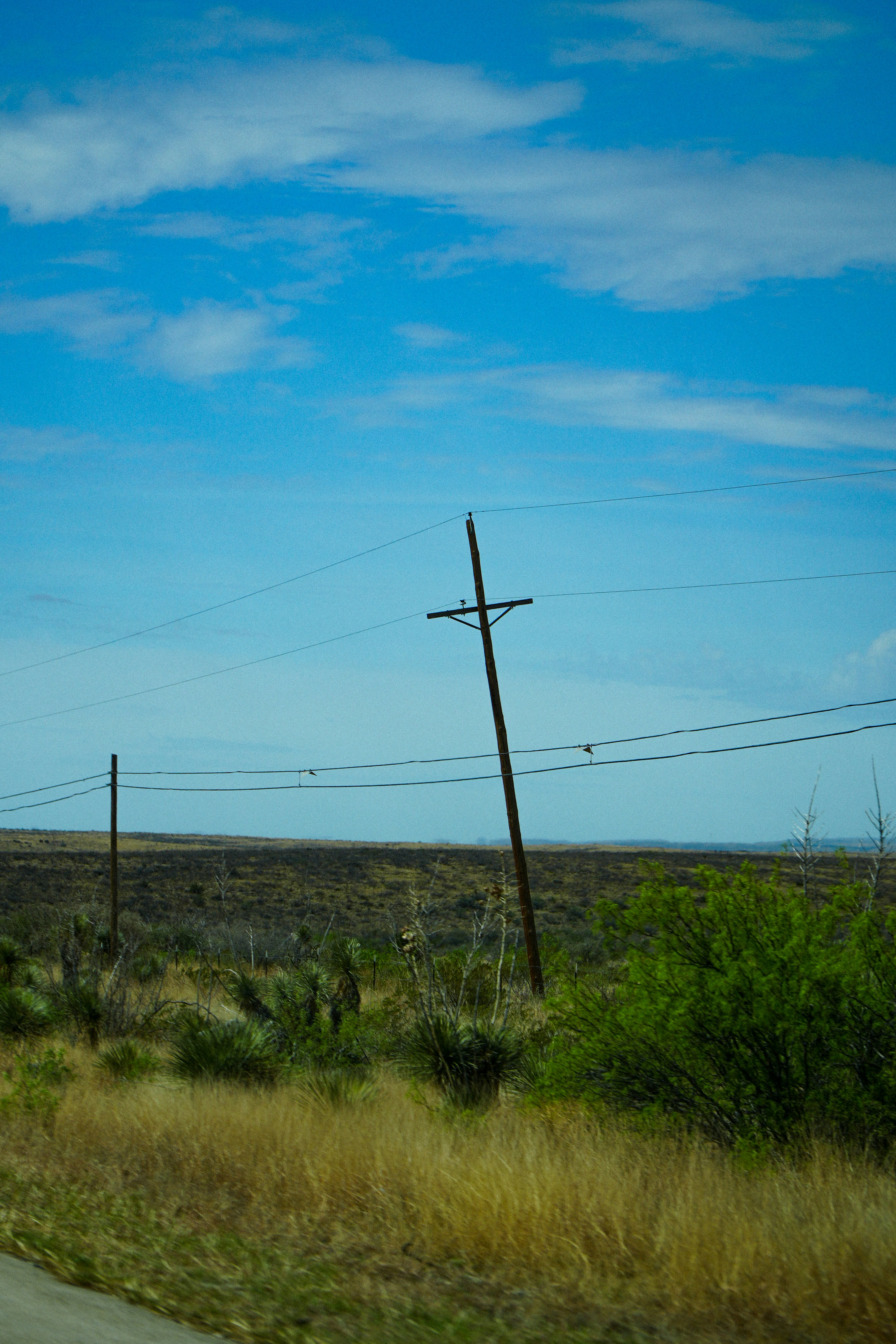 Lonely Cross-Tbar: A Quiet Powerline Horizon