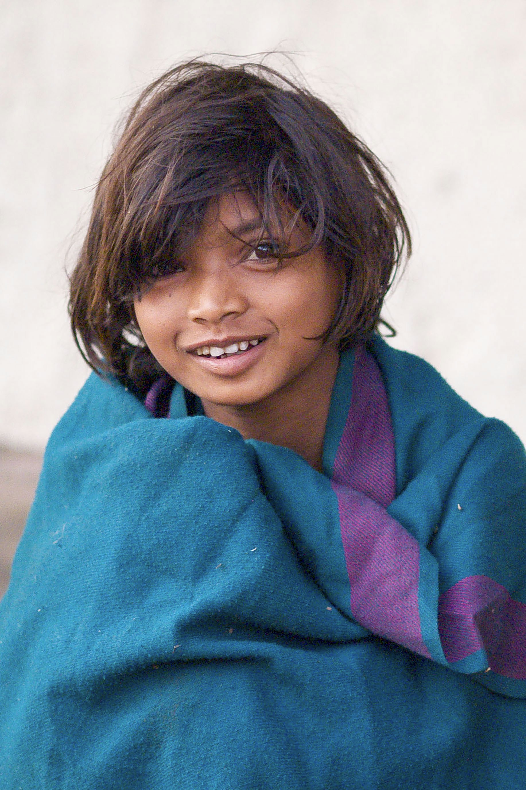 Bright-eyed Smile Across a Cool Wrap