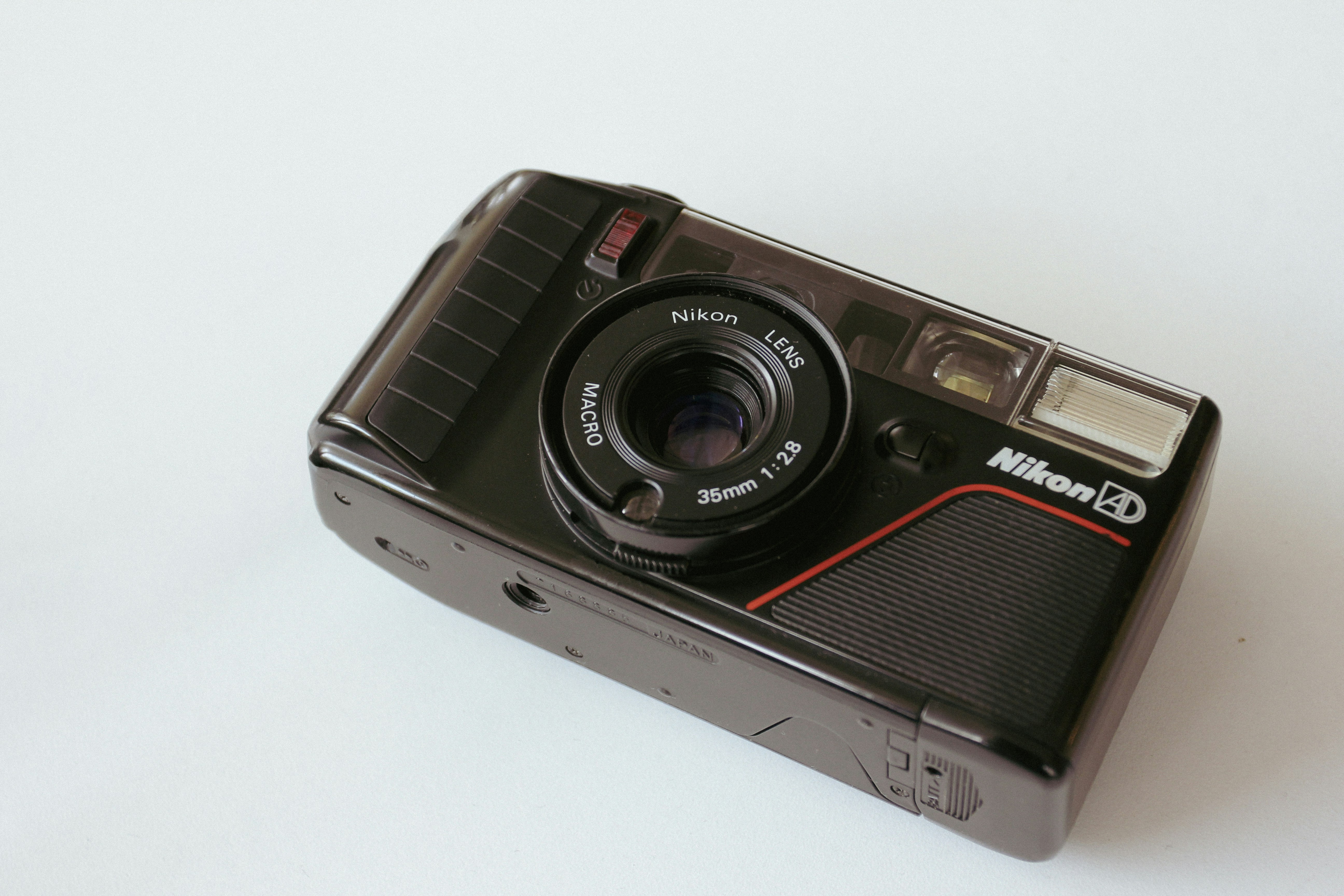 Retro Nikon Pose: A Compact Film-Style Point-and-Shoot