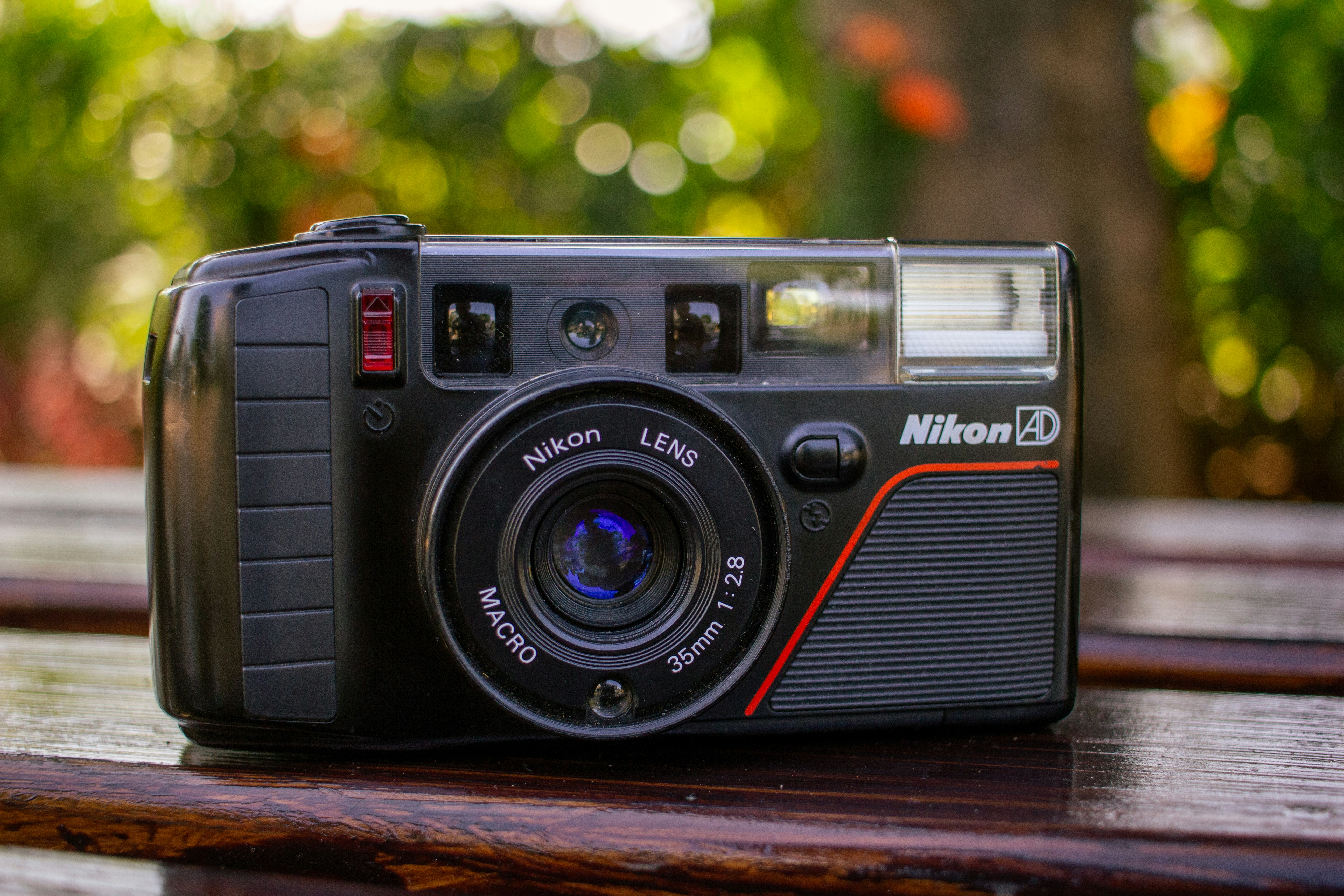 Classic Nikon 35mm Point-and-Shoot On a Wooden Bench