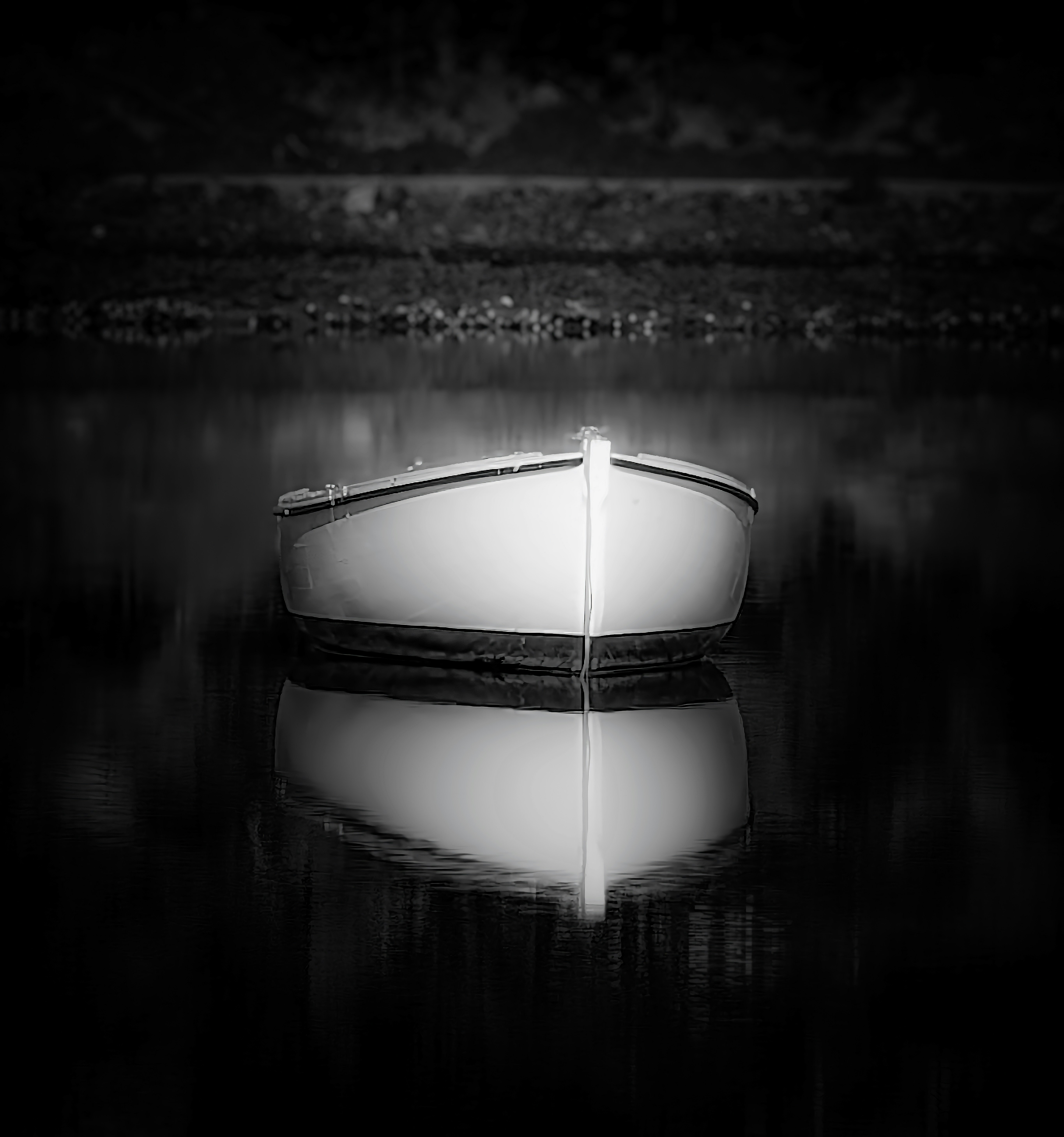Silent Vessel: A Lone Boat Halved by Waterlevel and Shadow