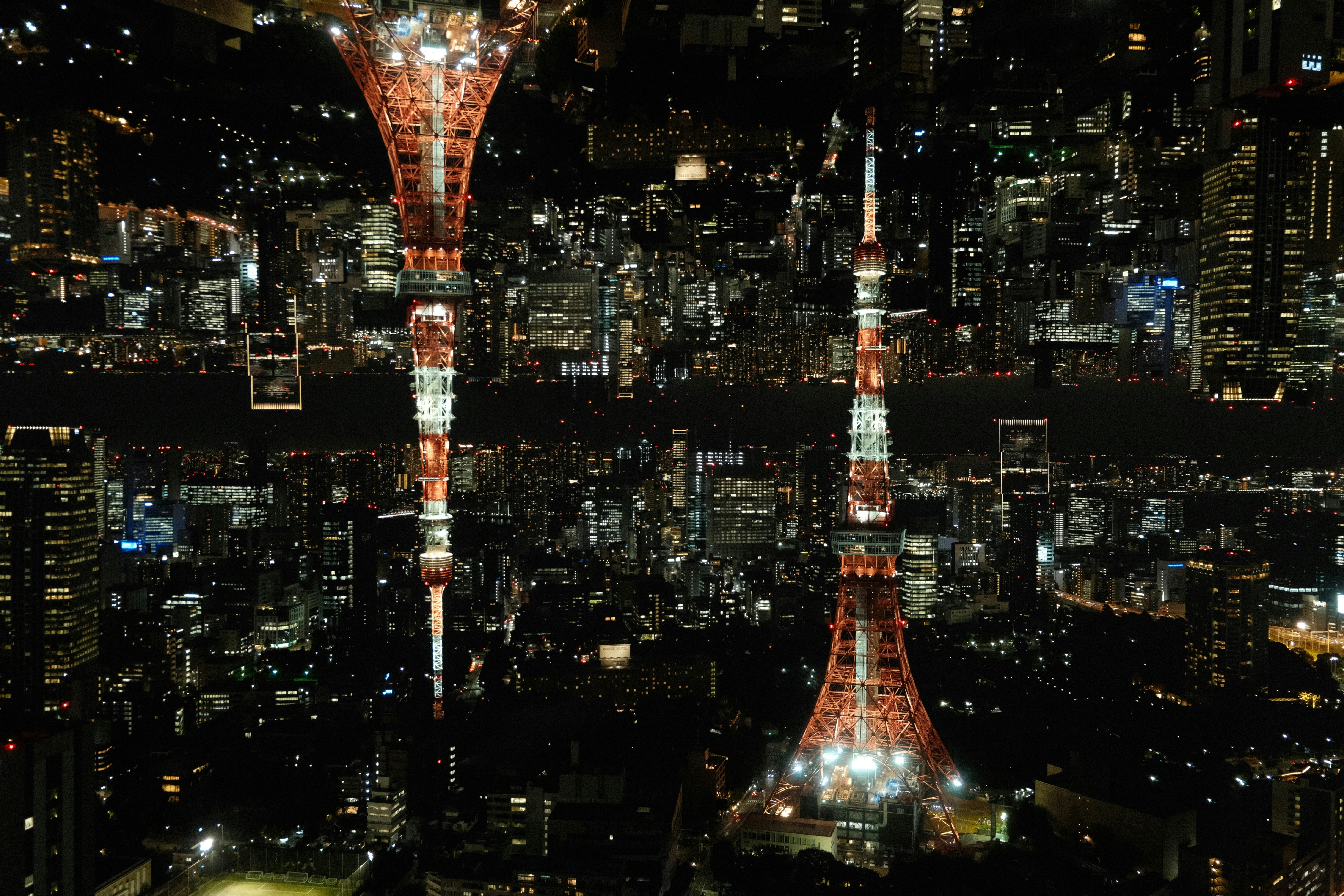Night-city Towers: Reversed Skyline in a Neon Glass