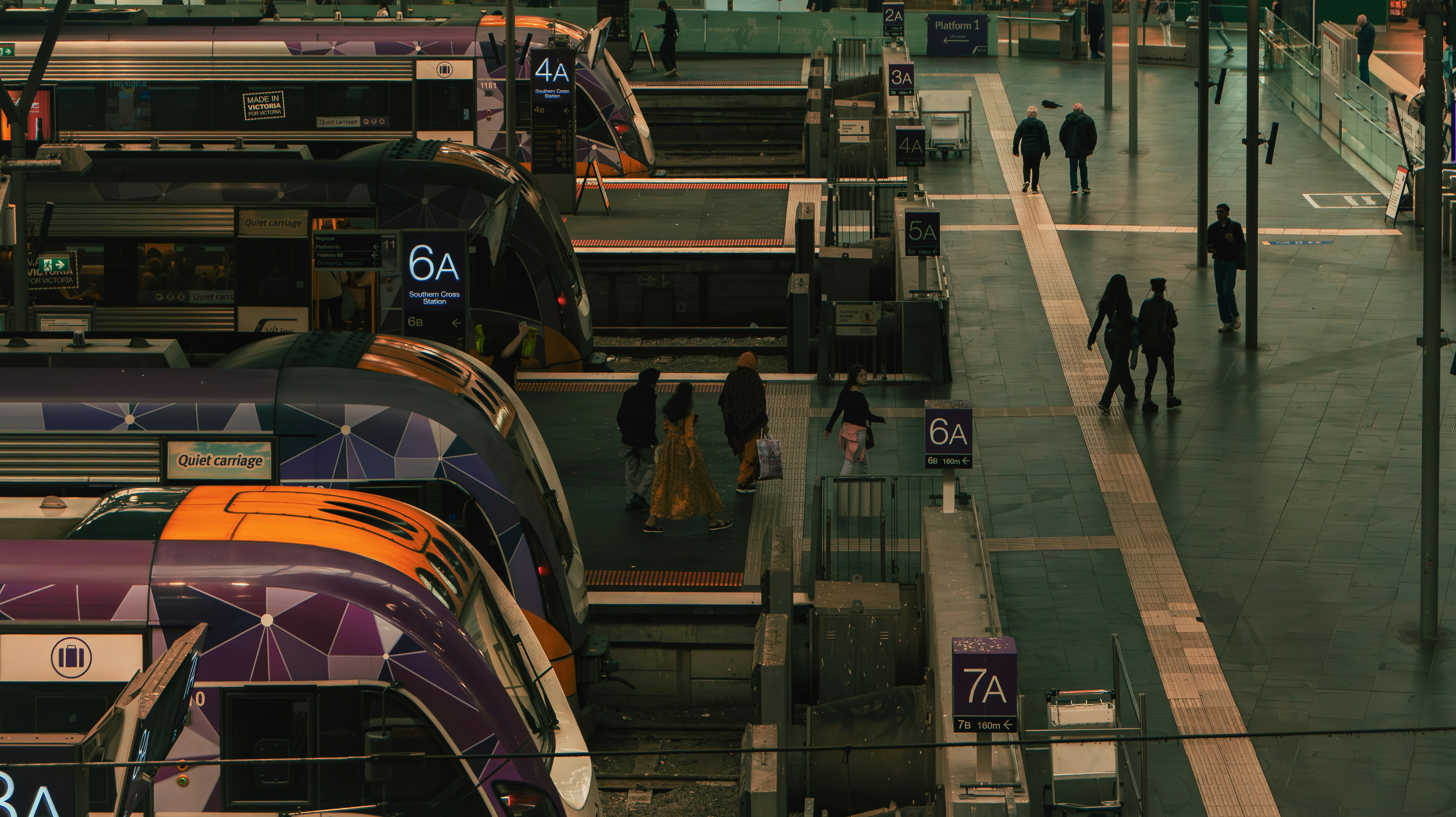 Tramyard Constellation: Colorful Carriages at a Quiet Station
