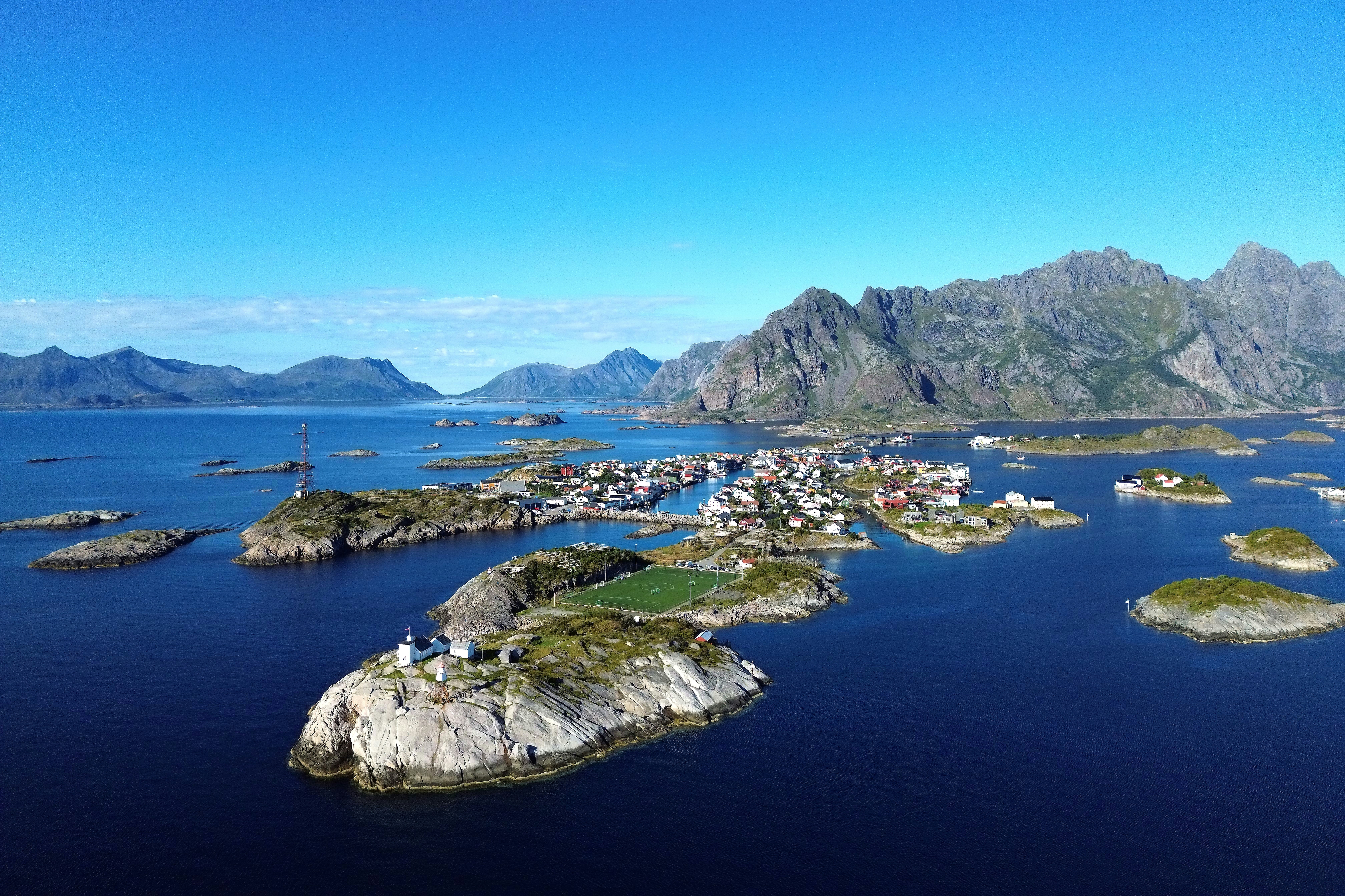 Littoral Village Cluster Nestled amid Rugged Fjords