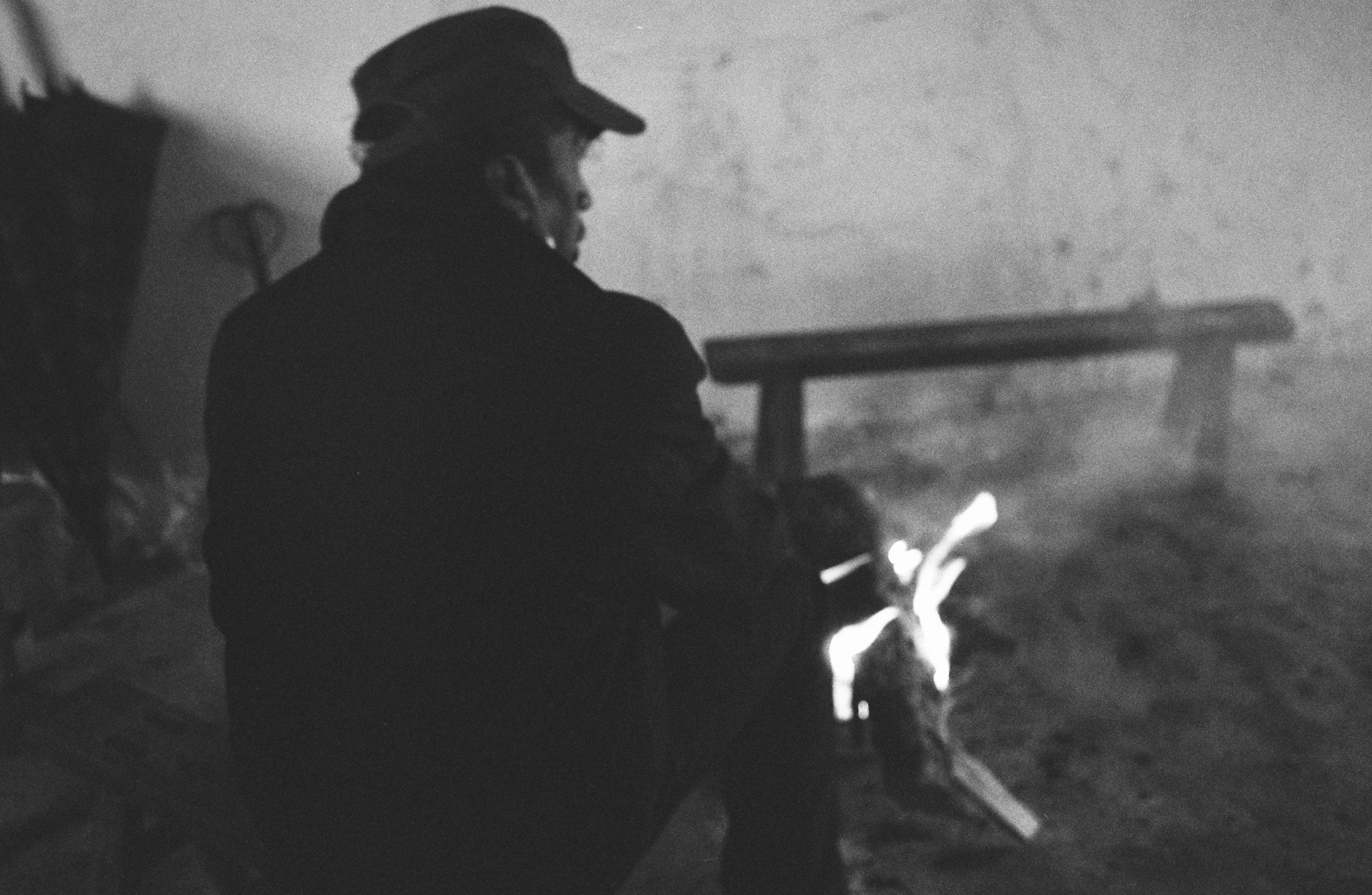 Silhouette by the Fire: Portrait in Low Light