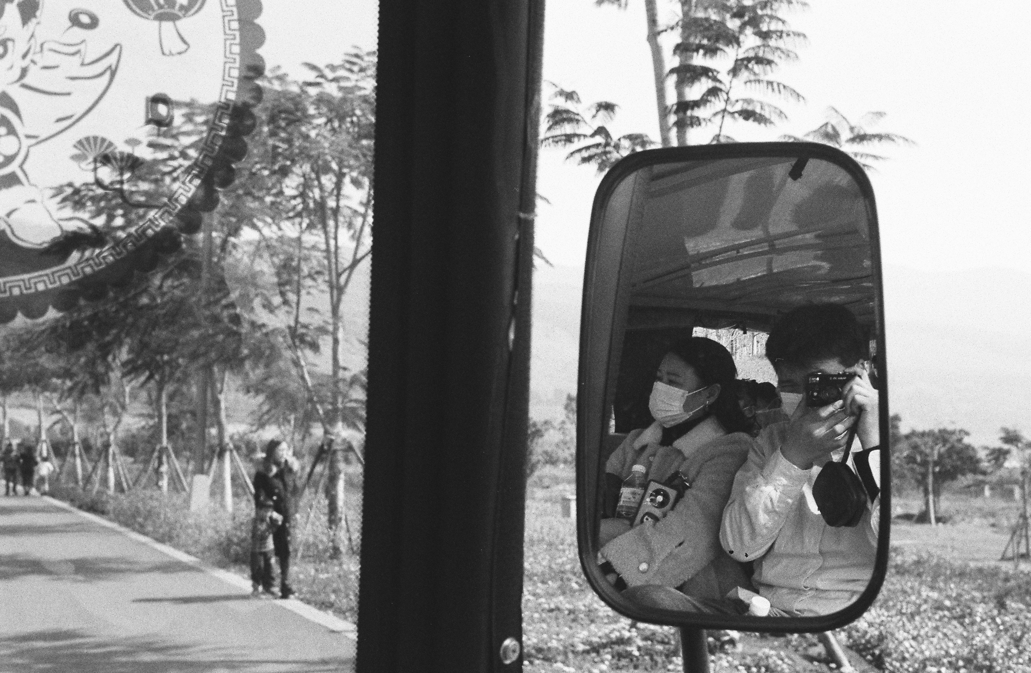 Reflection in the Side Mirror: Hidden Moments on a Quiet Campus Road