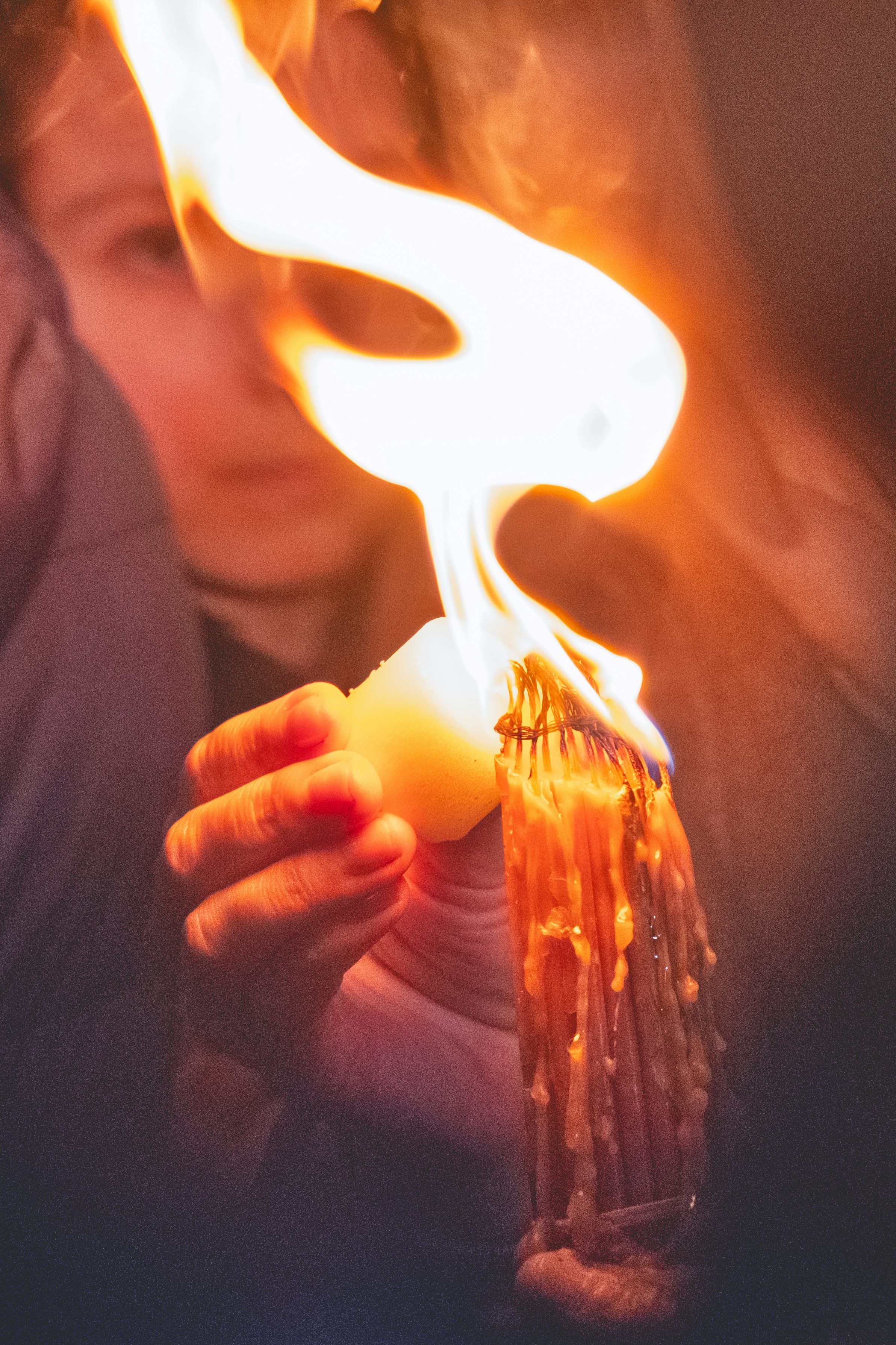 Flame-Grasp: A Tender Moment with a Candlelit Hands
