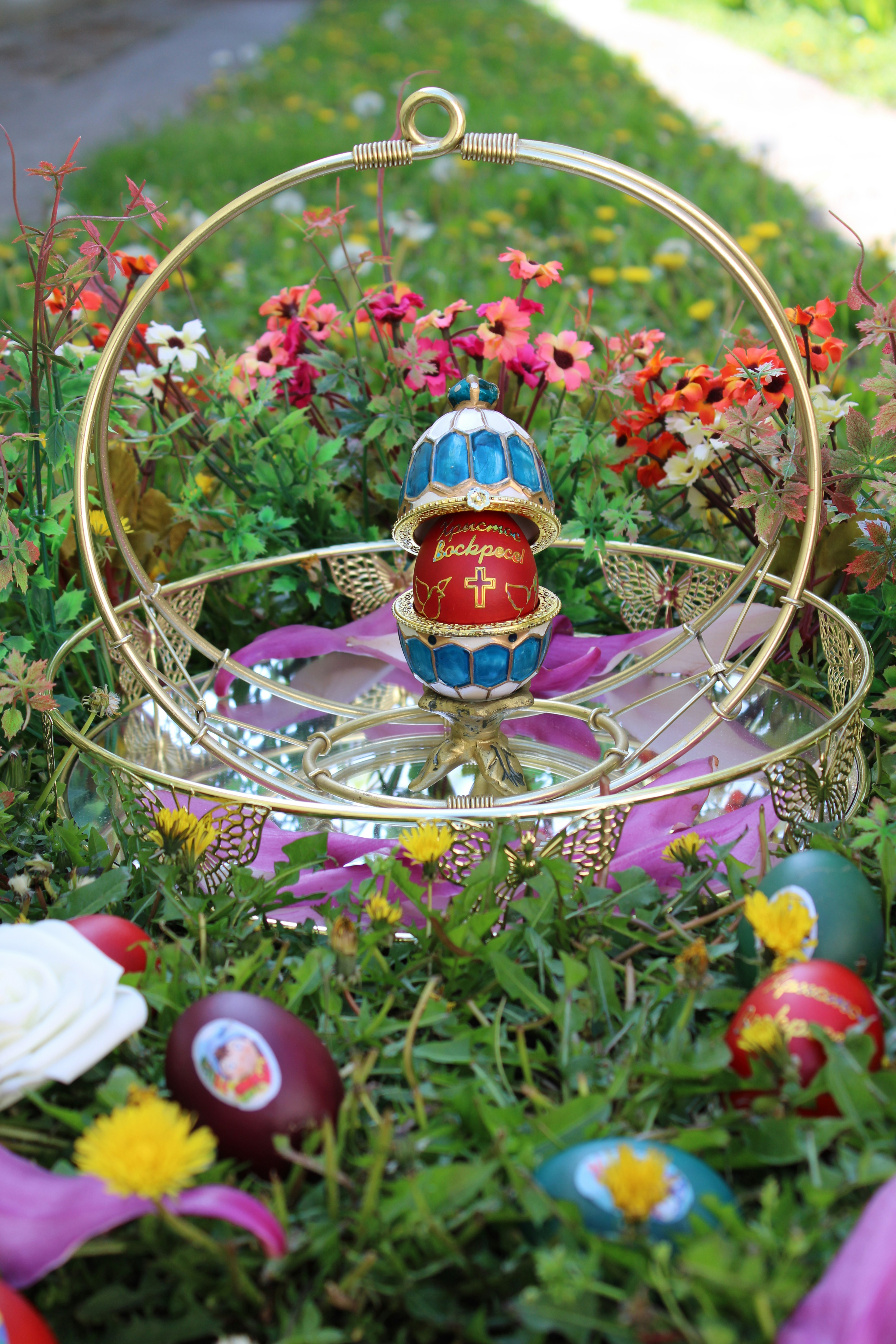 Ornate Easter Orb in a Garden of Blooms