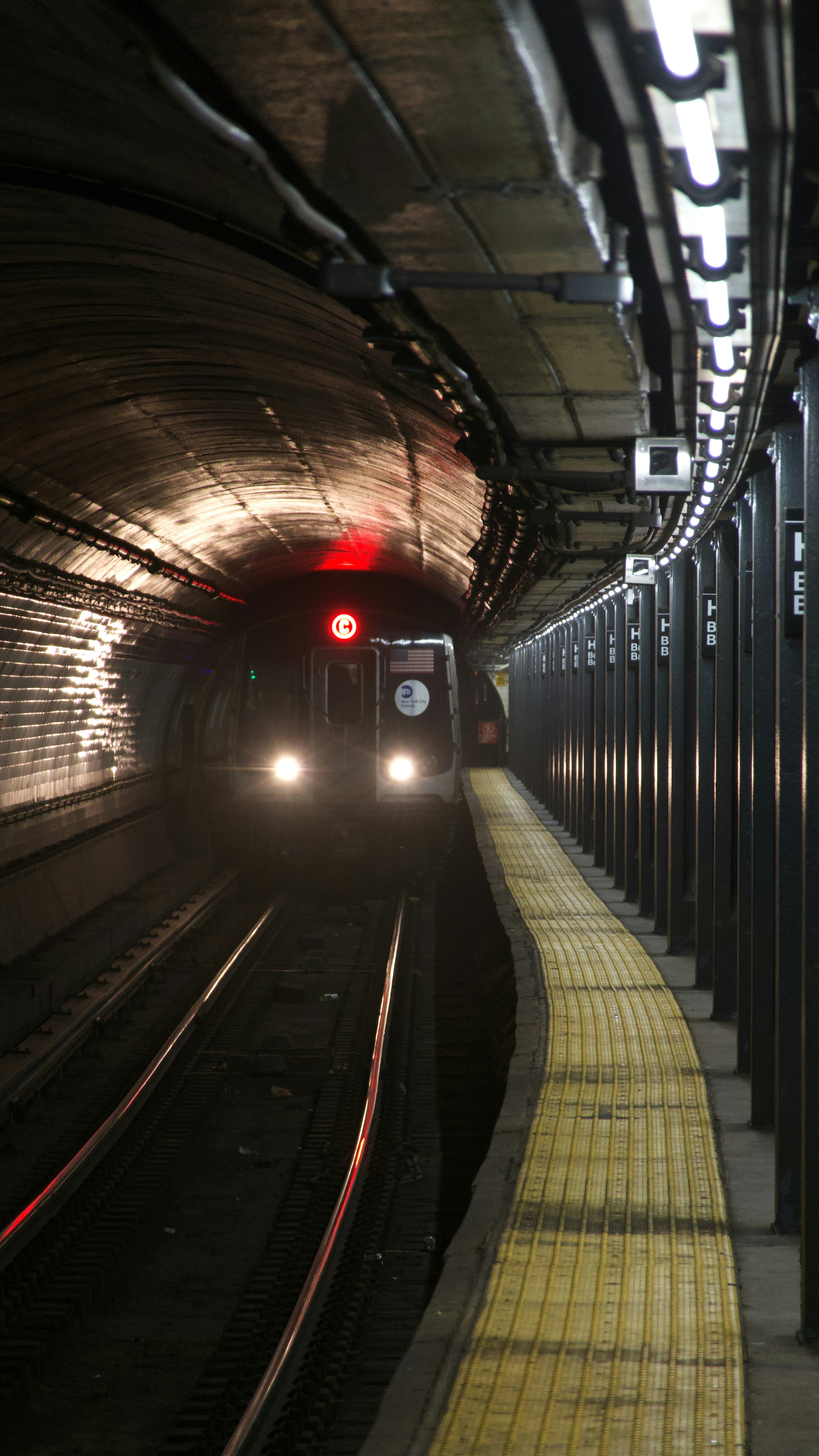 Midnight Metro: Headlights Converge in the Tunnel
