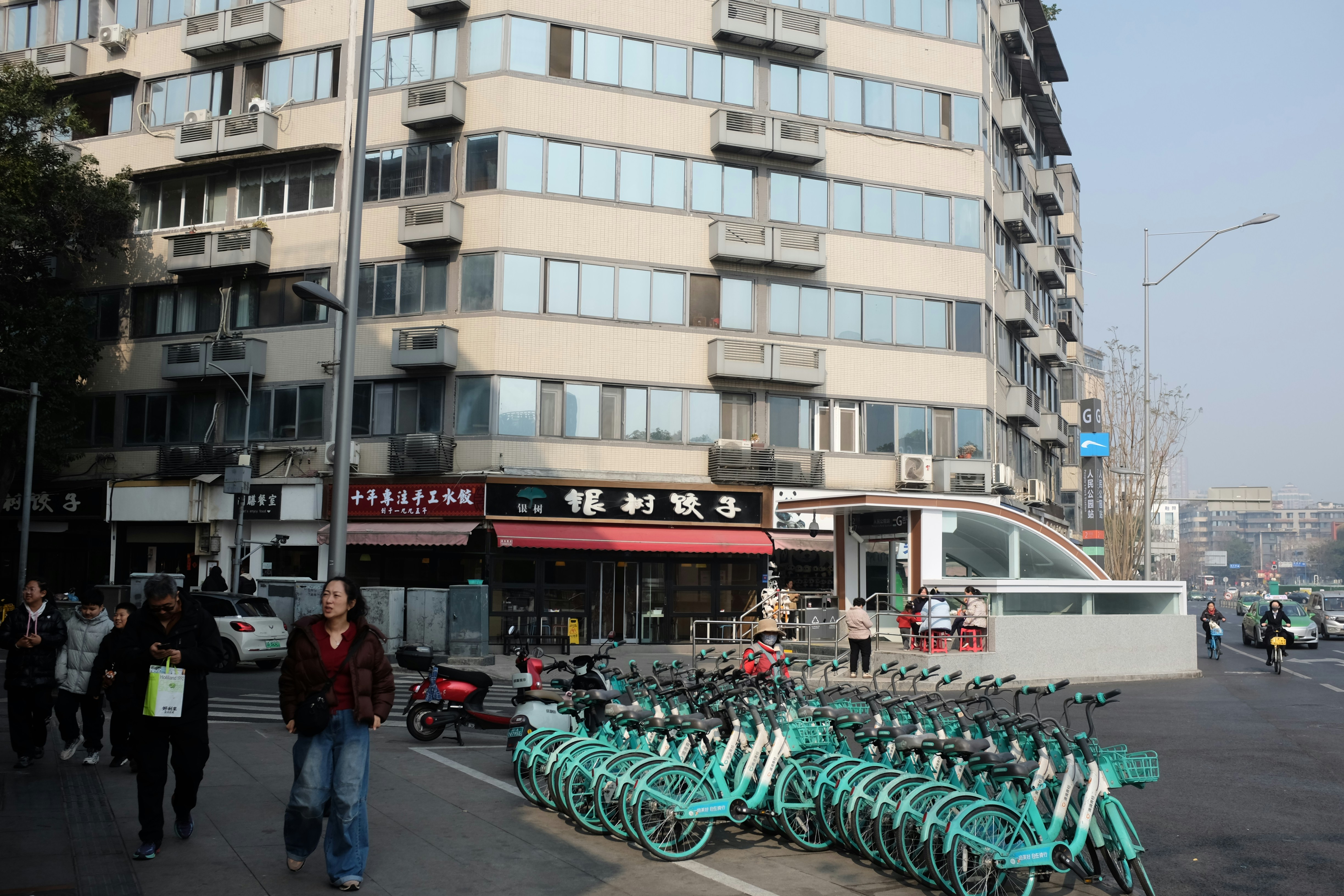Street Scene with Shared Bicycle Dock and Urban Facade