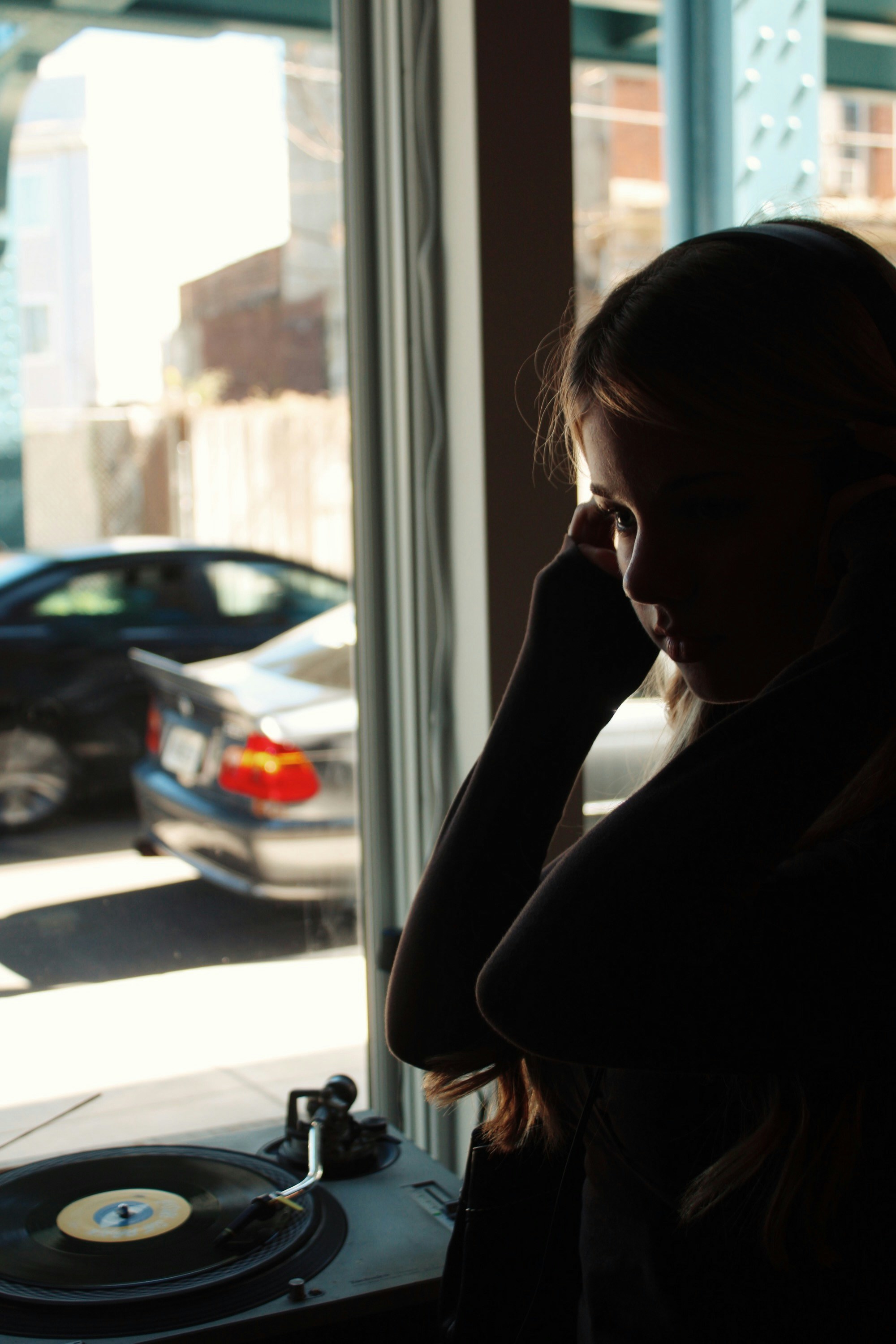 Silhouette by the Window: a Quiet Portrait with a Turned Head