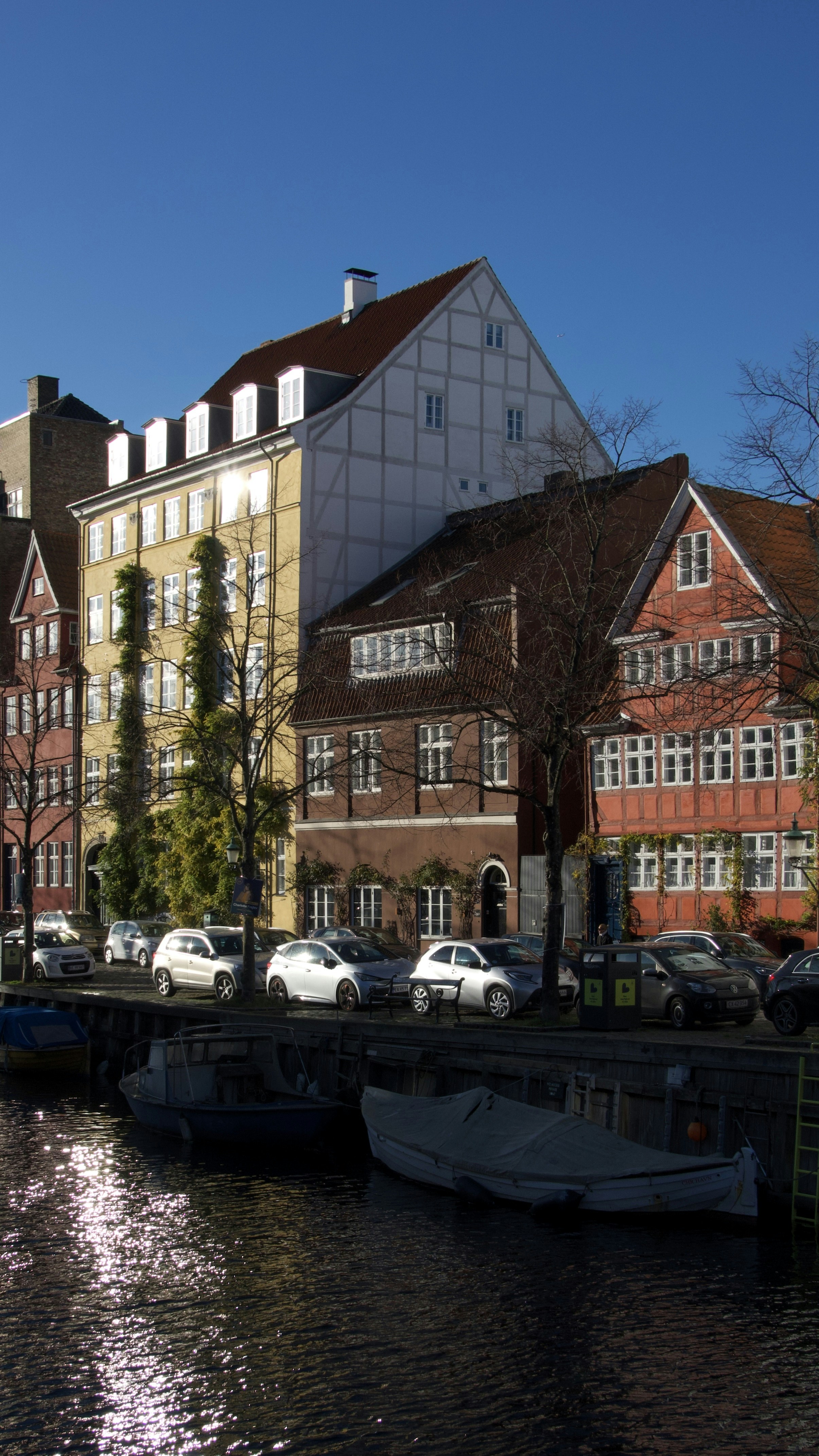 Sunlit Row Houses By a Quiet Canal