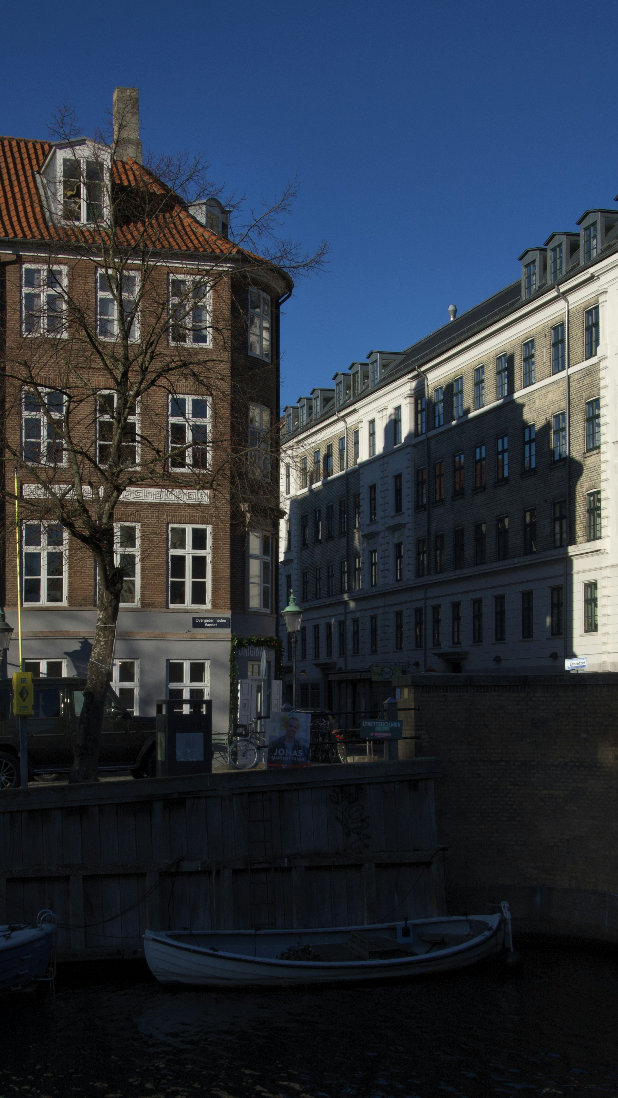 Sunlit Facades Over a Quiet Canal