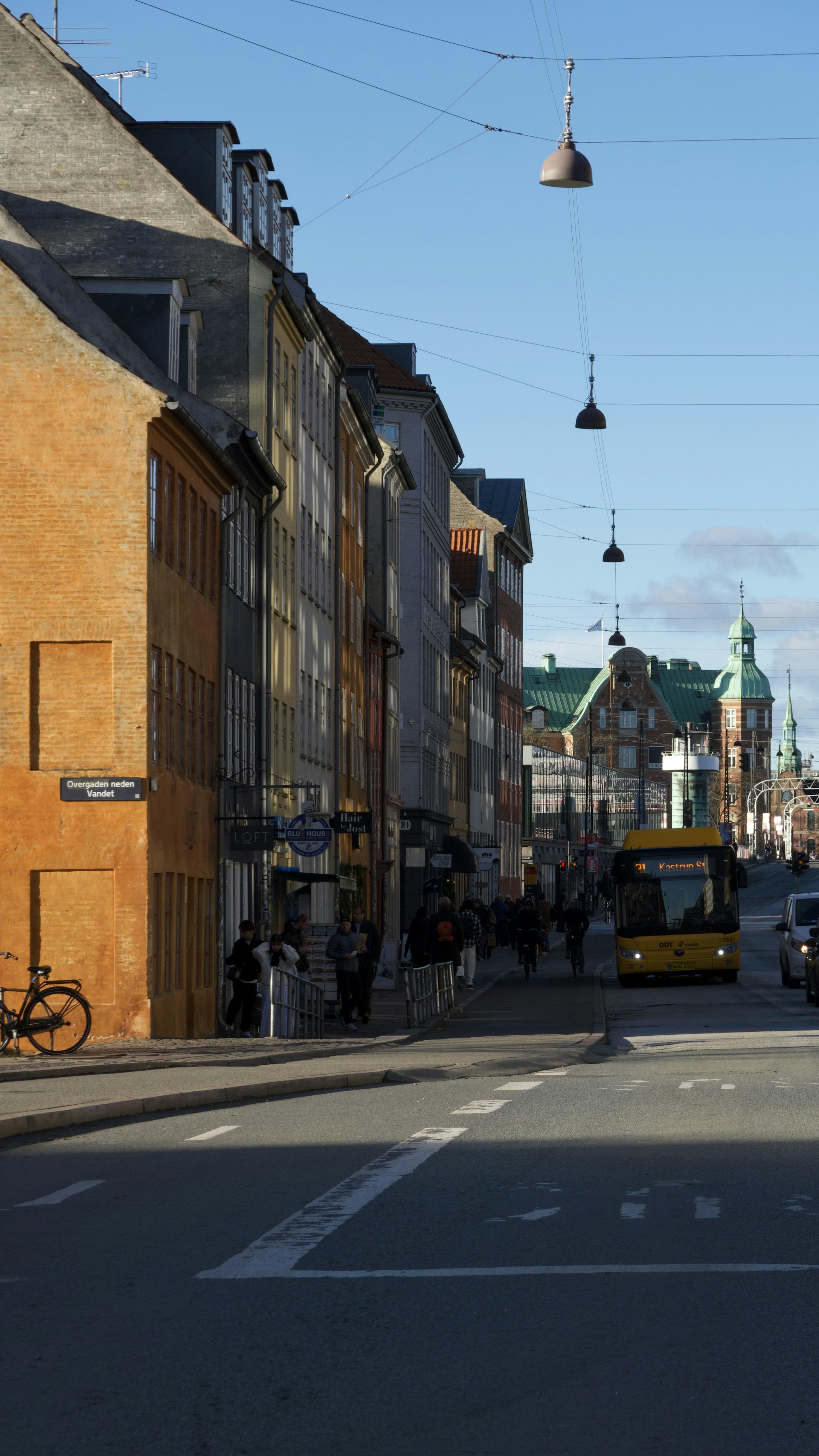 Sunlit Rua: A Nordic Street Painted in Color and Motion