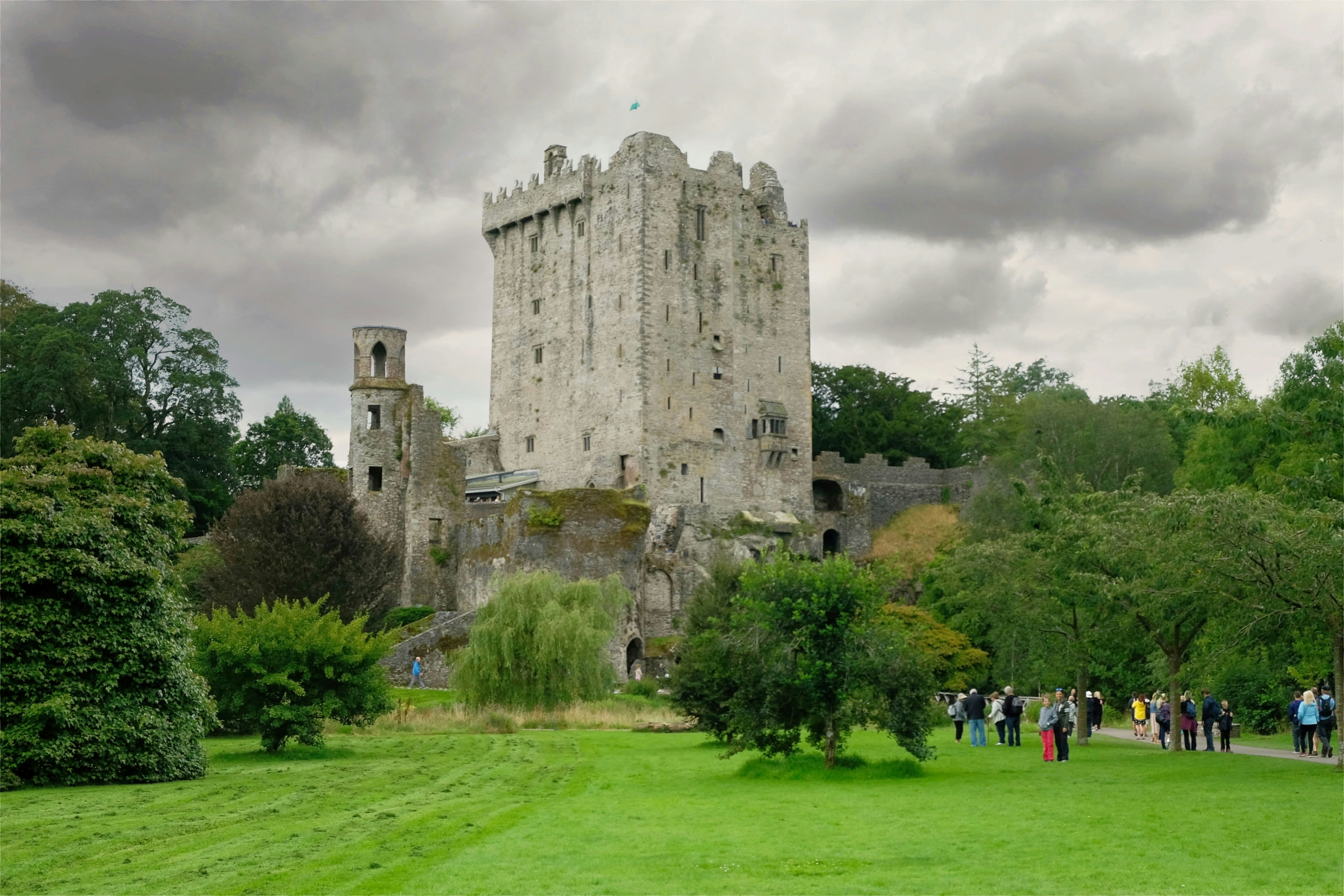 Castle in the Park: Ruins Beneath Stormy Skies
