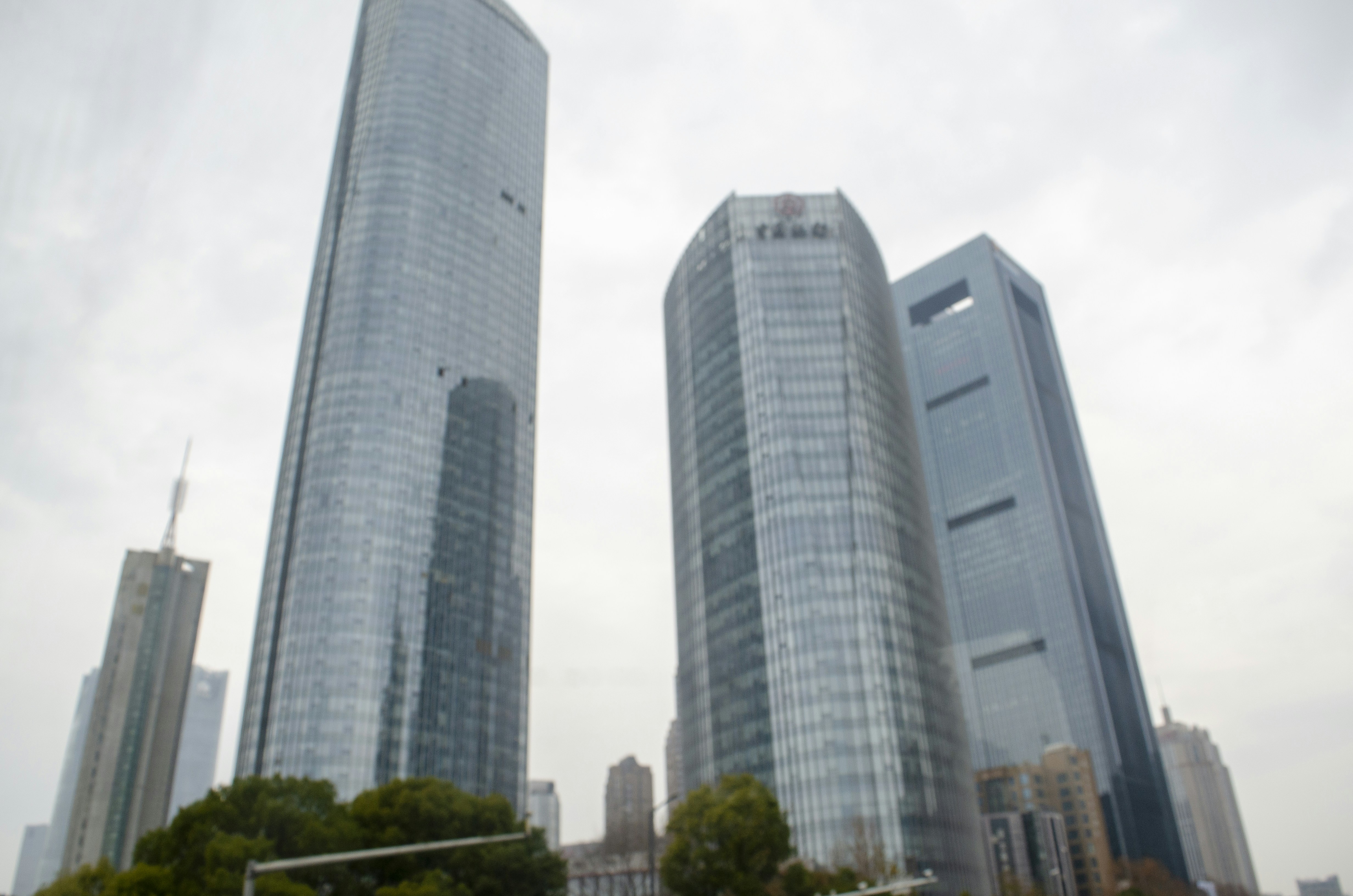 Twin Towers Revered: Glass Giants Over a Morning Grid
