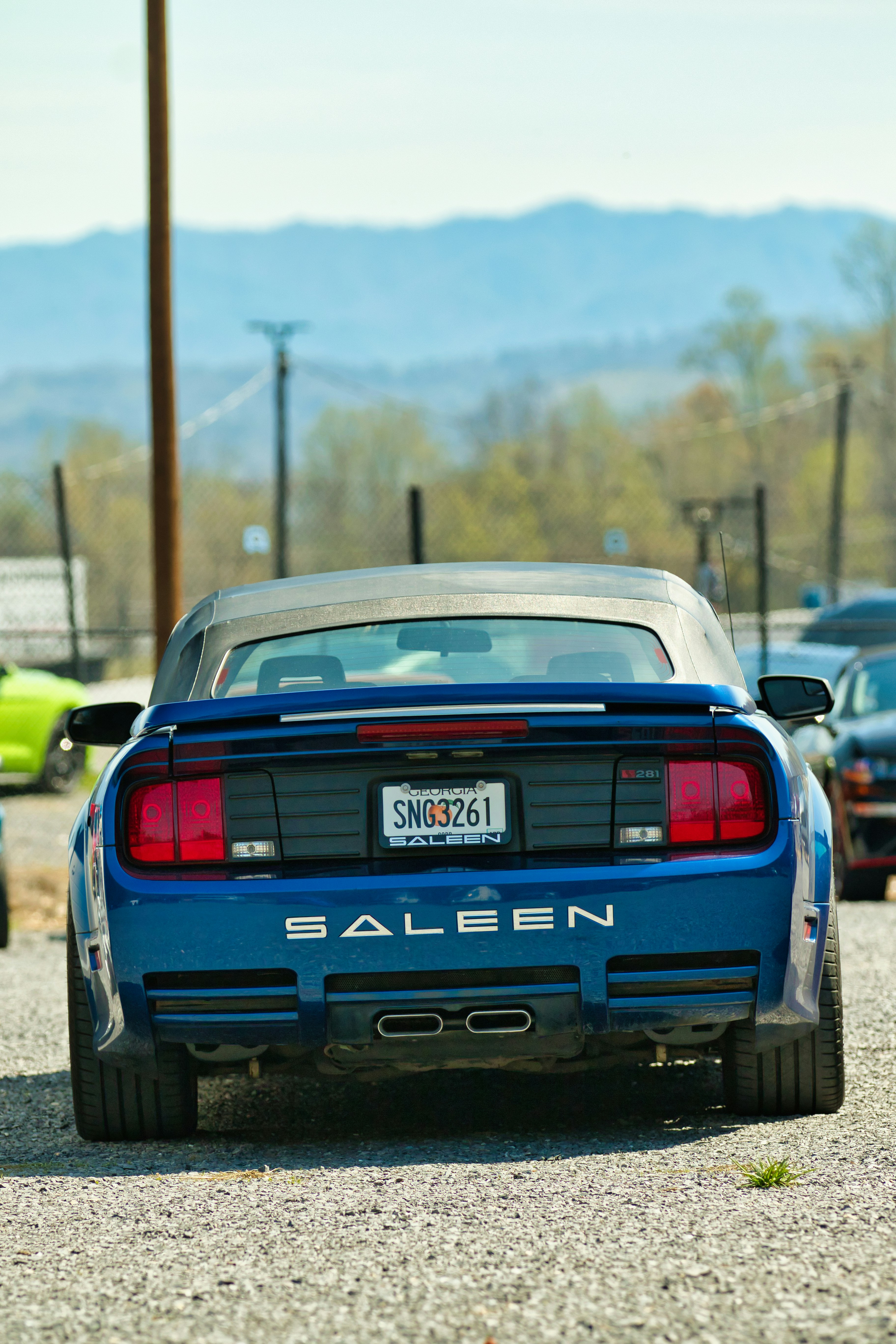 Blue Shelby Saleen Resting in a Gravel Lot