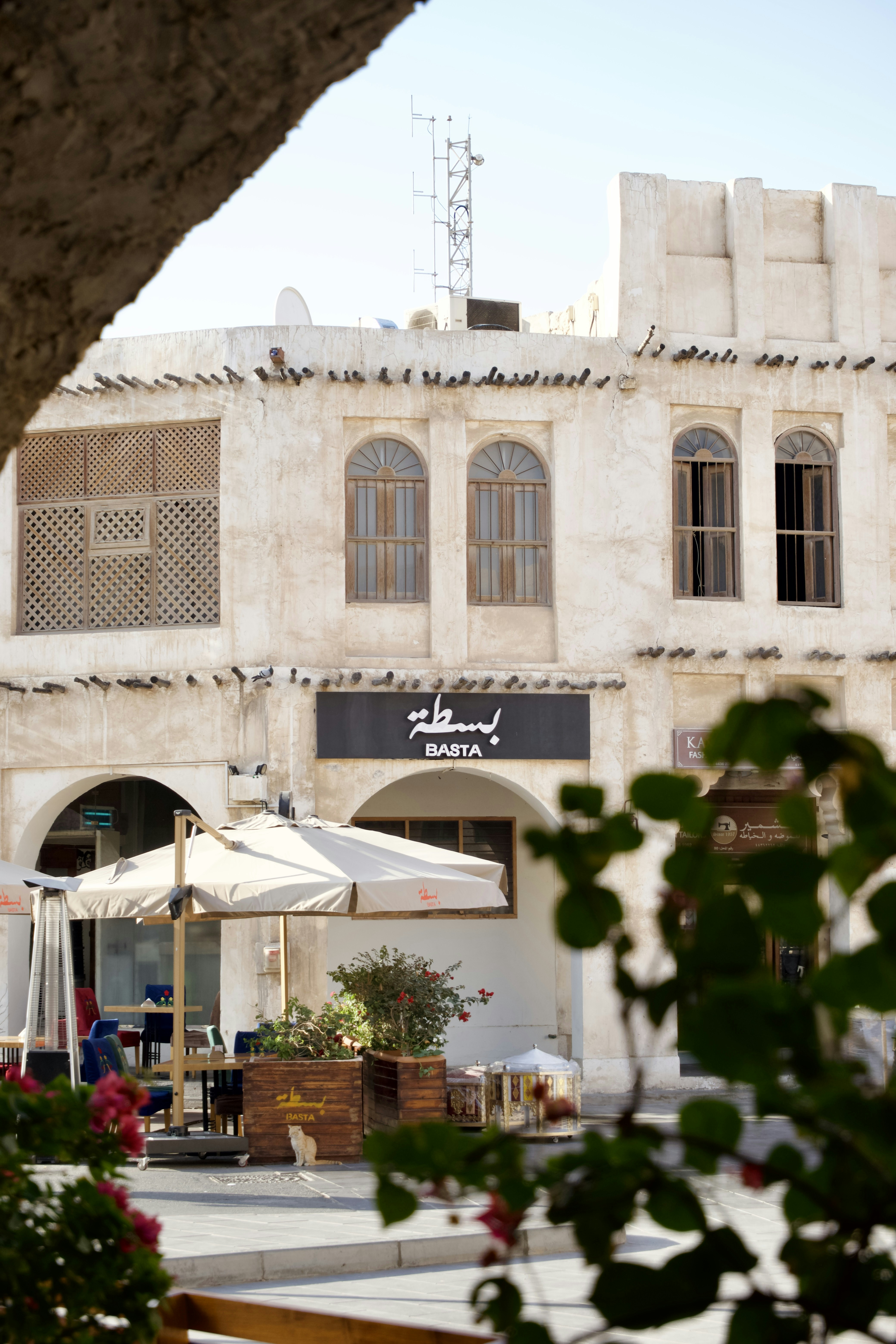 Café Front in Sunlit Medina Facade