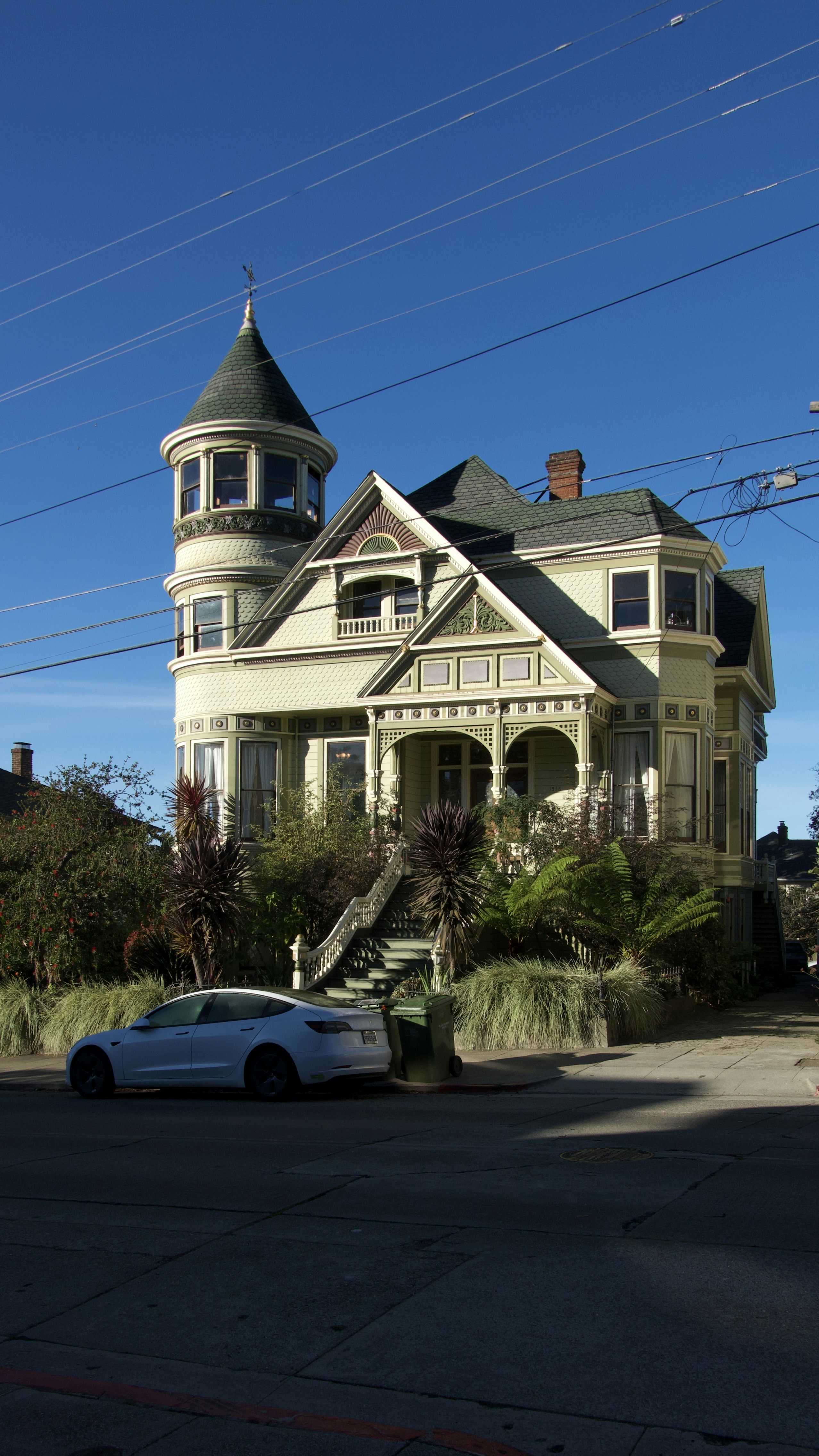 Architectural Fantasy: A Victorian House under a Clear Blue Sky