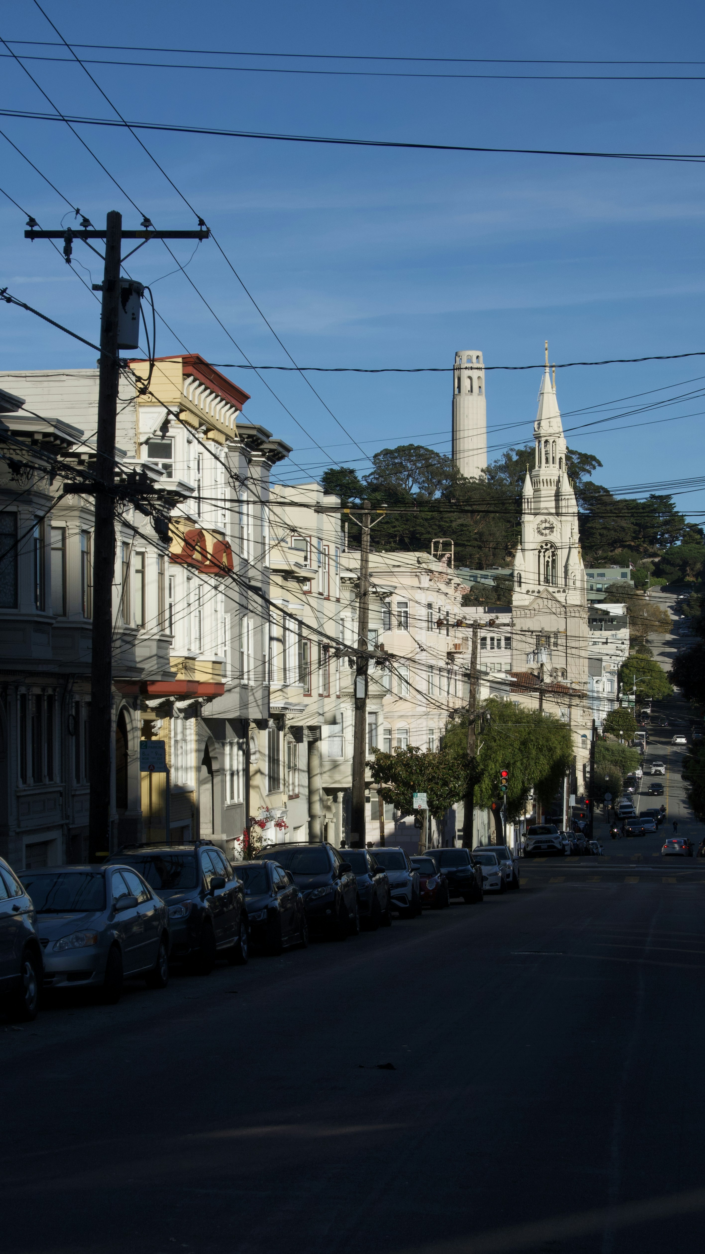 San Francisco–style Hill Street with Towered Church and Cable Lines