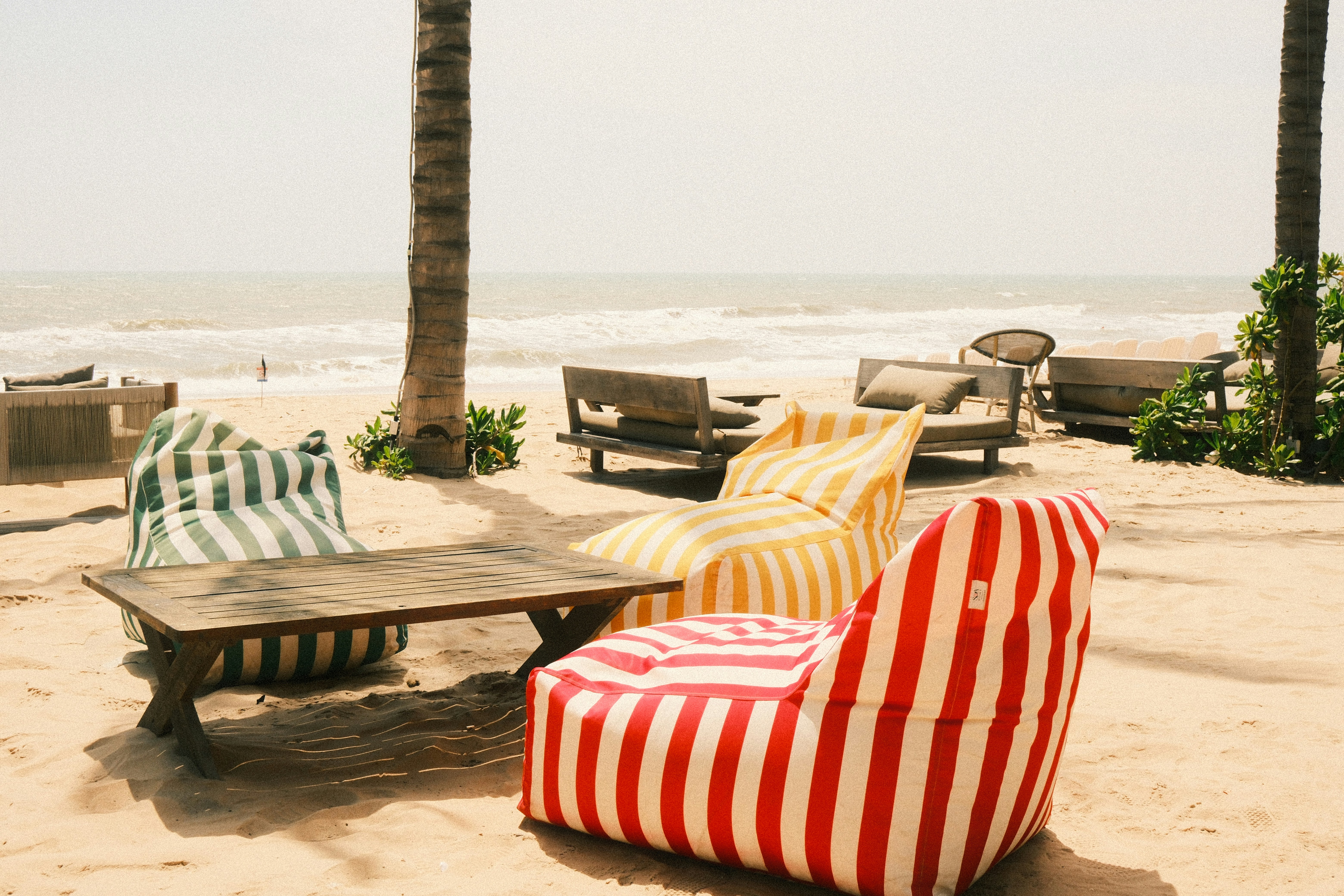 Striped Beach Chairs at Rest by a Quiet Sea