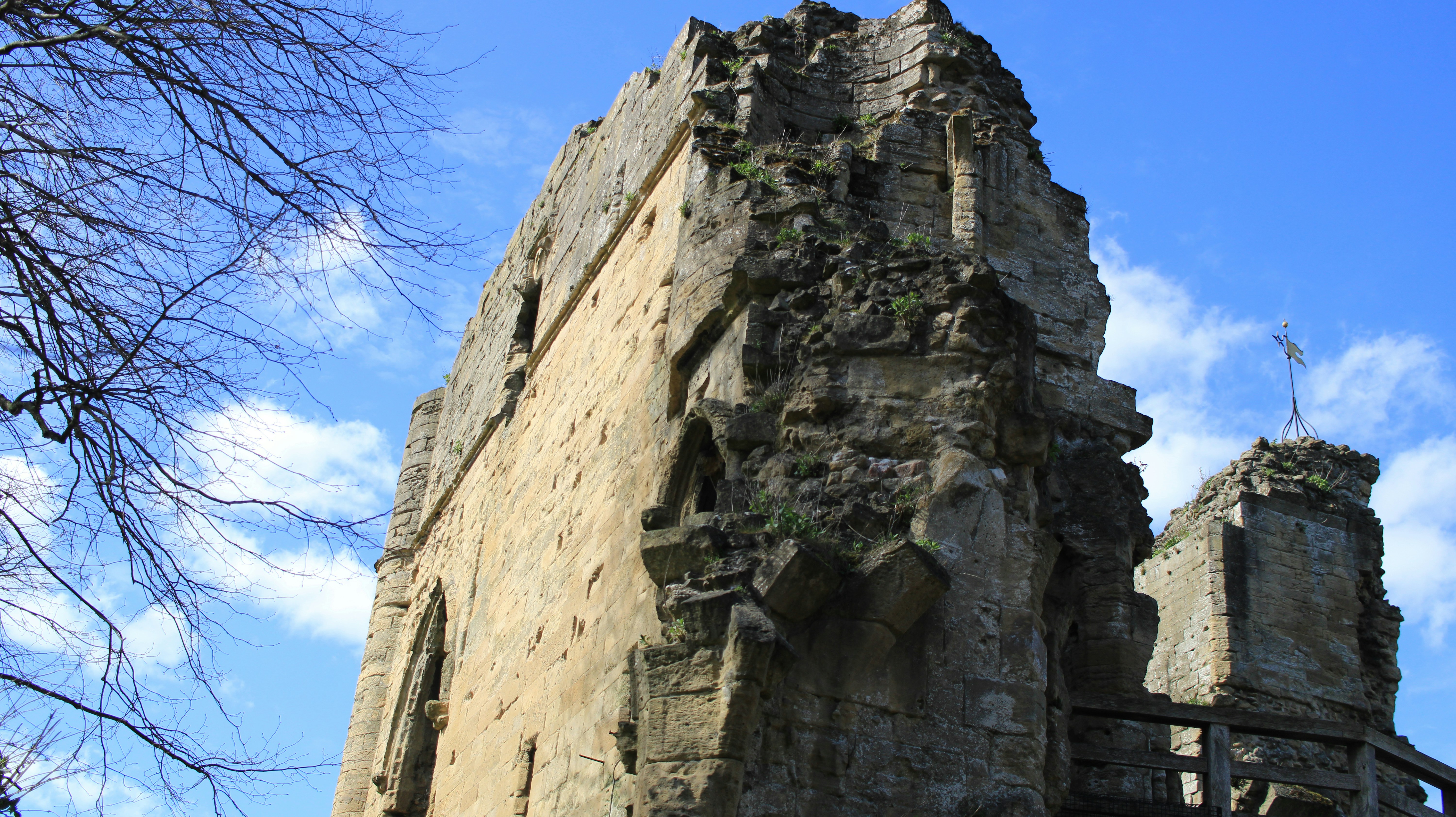Ruined Stone Keep Reaching Toward a Blue Sky