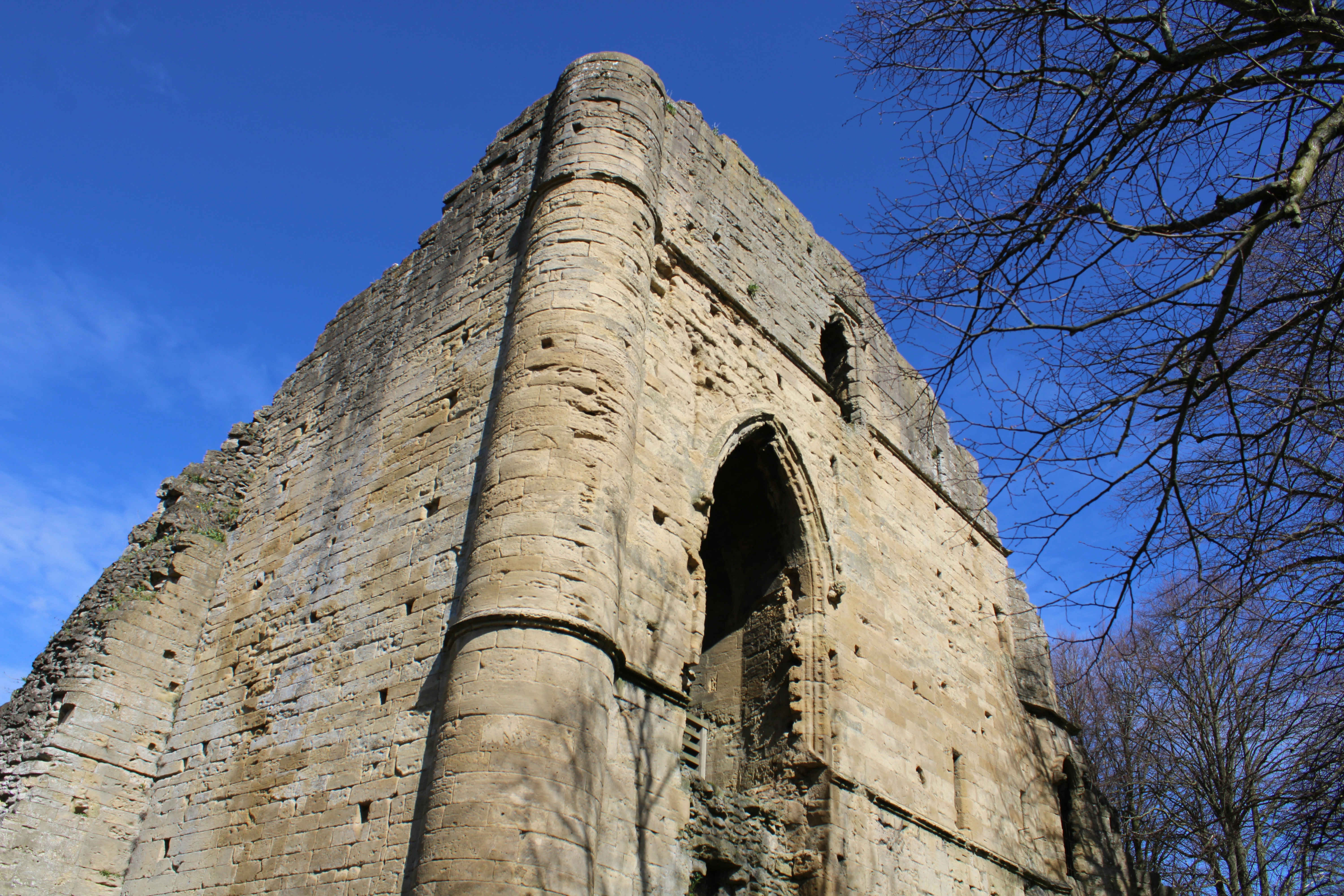 Stone Arches Beneath a Quiet Blue Sky