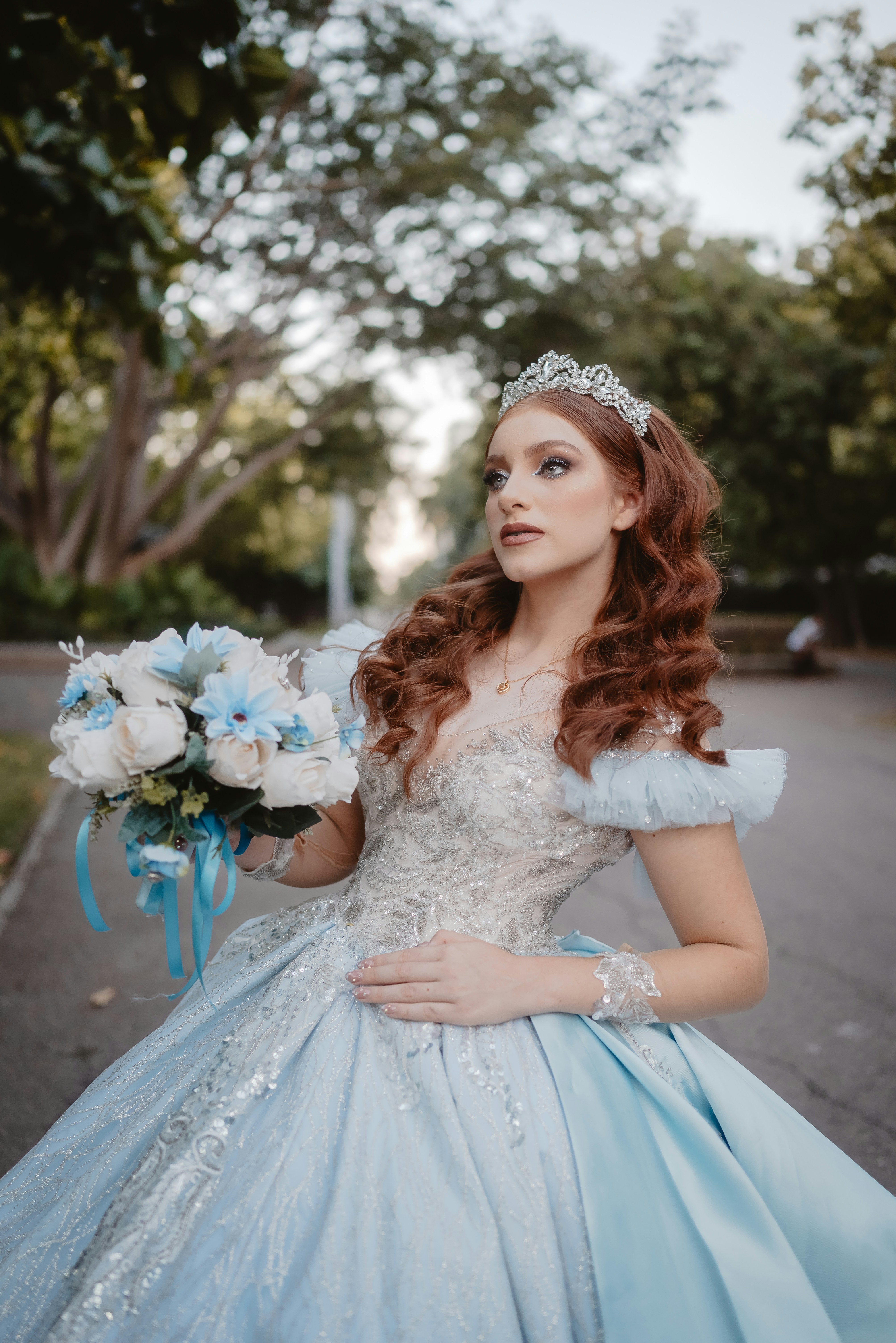 Cinderella in Blue: A Portrait of Glamour and Gossamer Gowns