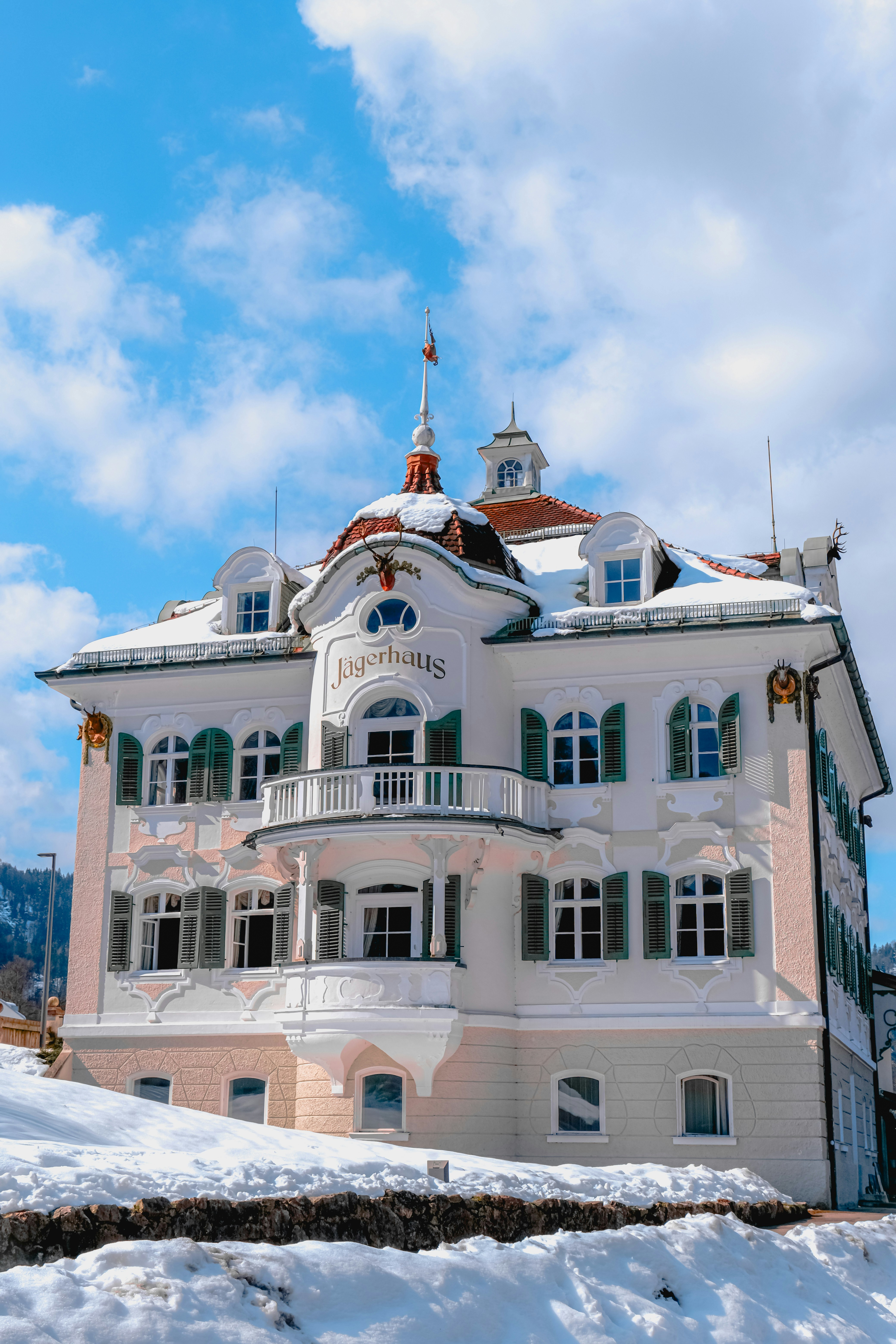 Ornate Alpine Hotel Under a Clear Blue Sky
