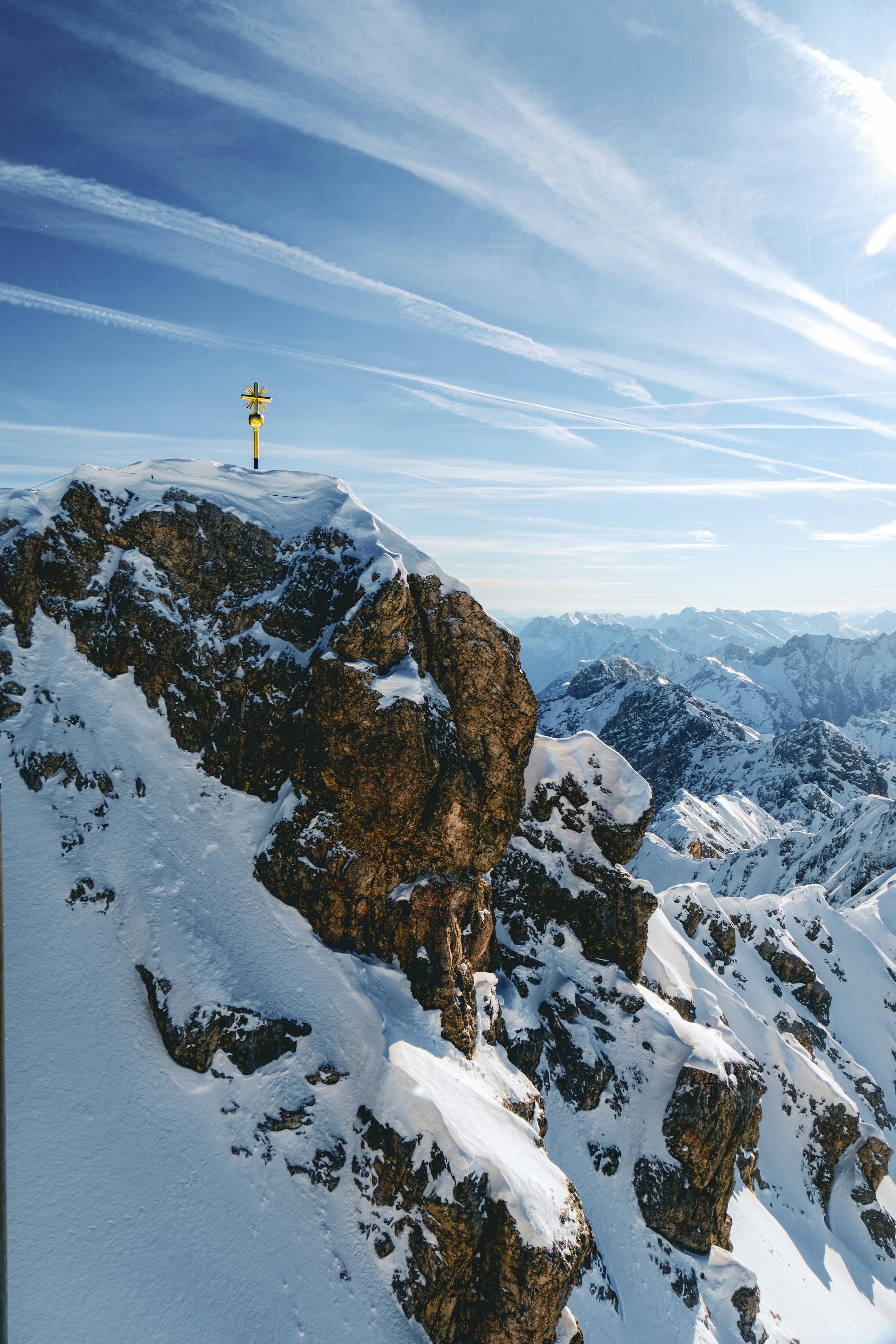 Golden Peak Cross Sees the Sky